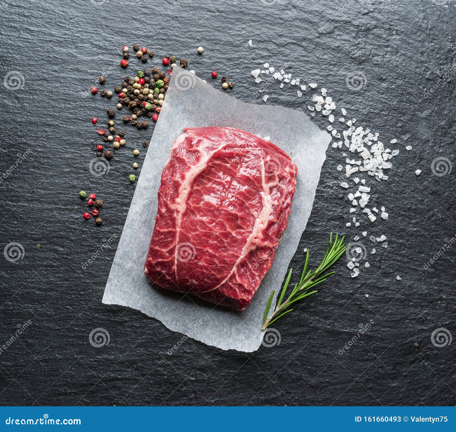 The Top Blade Steak Or Beef Steak With Herbs And Spices On White ...