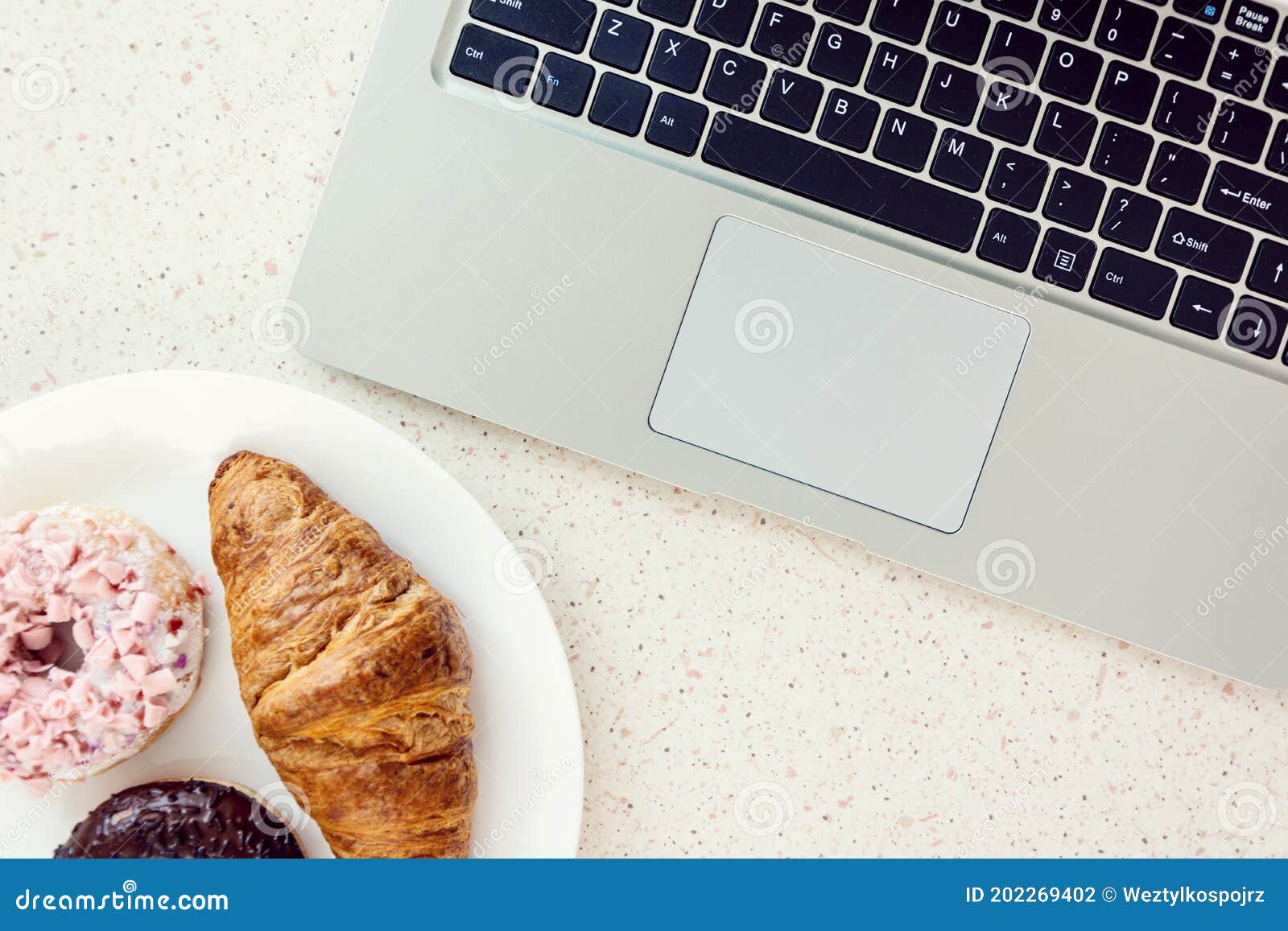 Top of the Desk with Laptop Keyboard and Plate with Sweets Stock Photo ...
