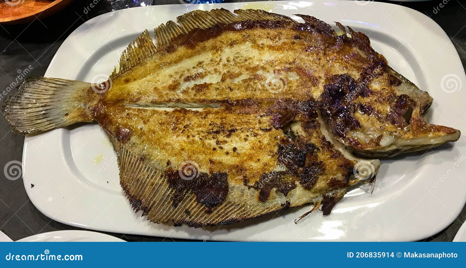 Top Down Authentic View of a Large Fresh Grilled Flounder on a Simple ...