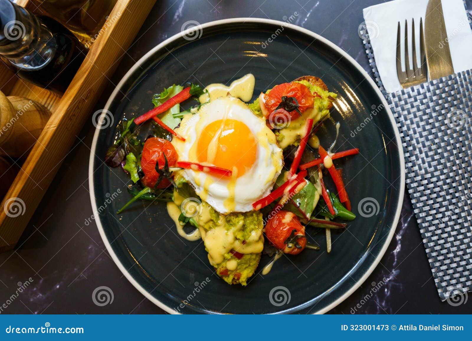 Top Down of Avocado Toast with Fried Eggs and Vegetables Stock Image ...