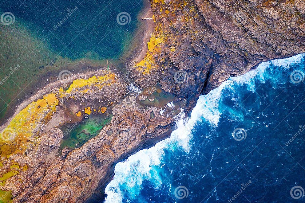 Top Down Cliffs and Coast Line with Waves Breaking Stock Image - Image ...