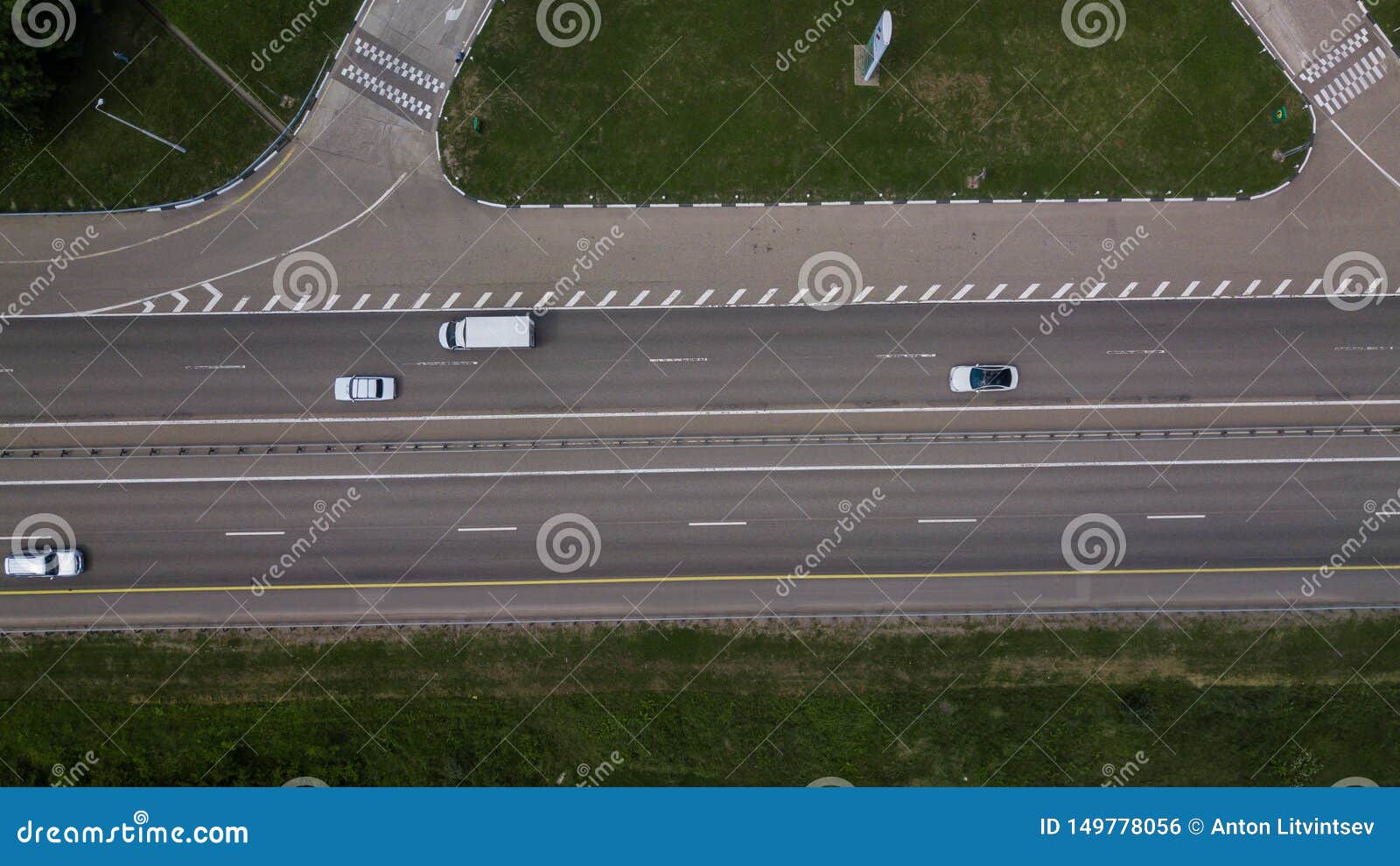 Top Down Close Up of Highway, White Arrow Signs Indicating Direction ...