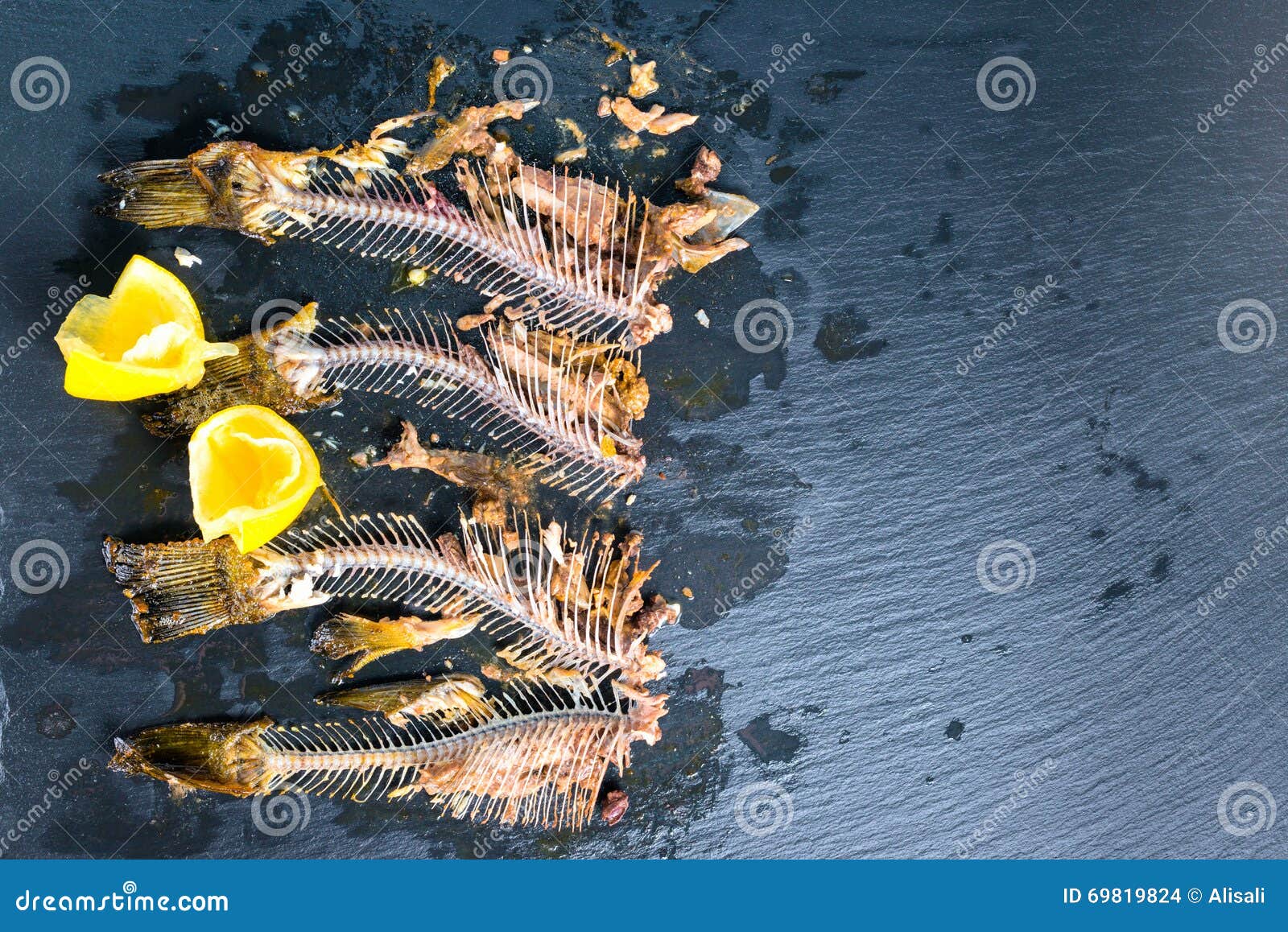 Top Down of Fish Skeleton Bones without Heads, Squeezed Lemon on Stock ...