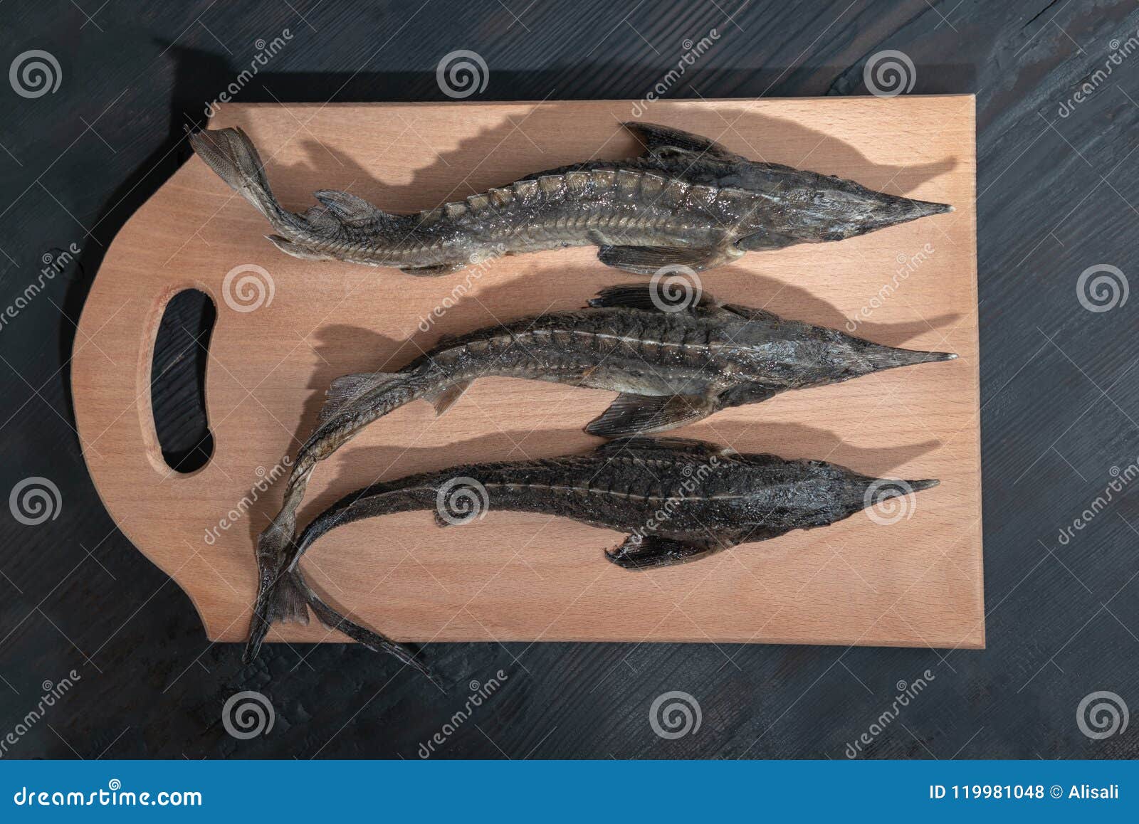 Top Down of Raw Sturgeon Fish on Wooden Background Stock Photo - Image ...