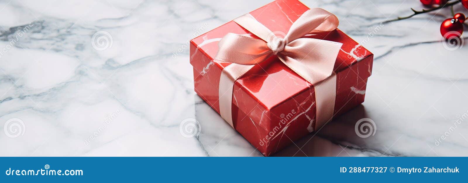 A Top-down View of an Elegant Red Gift Box Placed on a Sleek, White ...