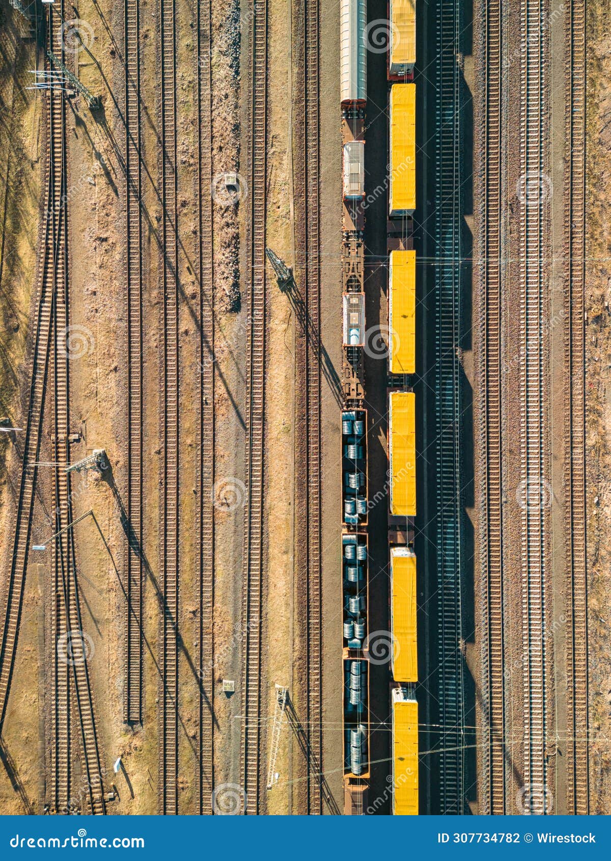 Top Down View of Freight Trains Driving between Multiple Train Tracks ...