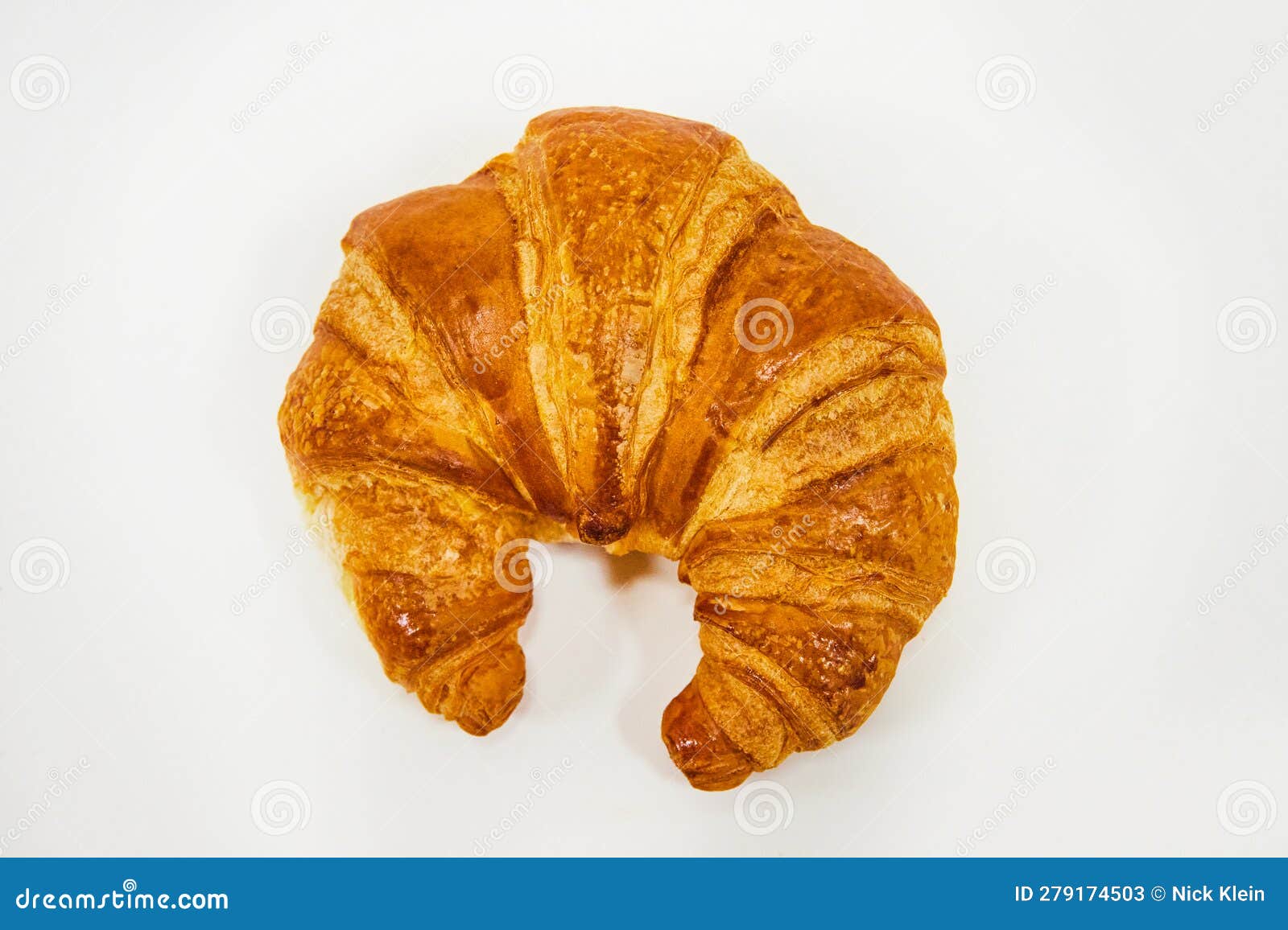 Top Down View of Fresh Baked Crescent Shaped Croissant on White ...