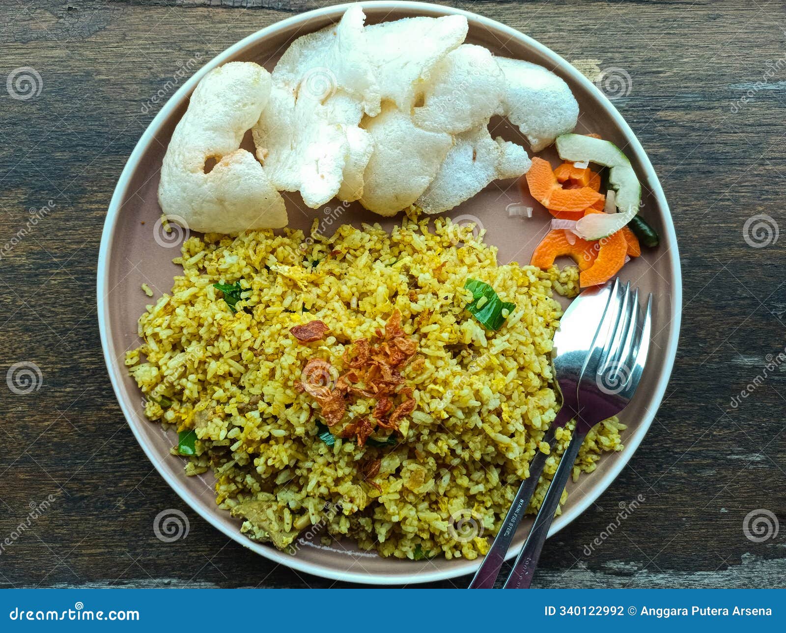 Top Down View of Fried Rice Plate with Crackers and Pickles Stock Photo ...