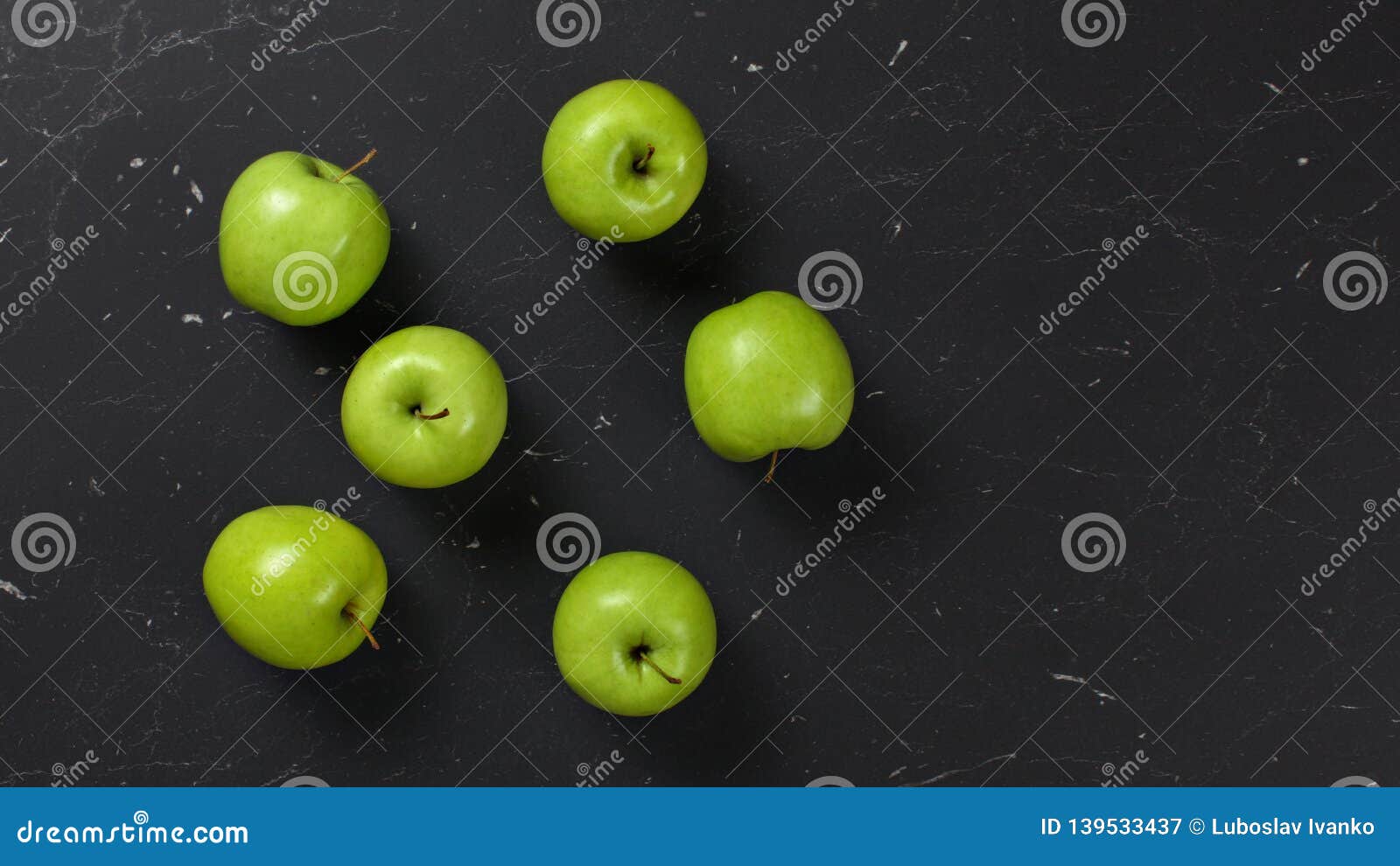 Top Down View, 6 Green Apples on Dark Marble Board. Space for Text on ...