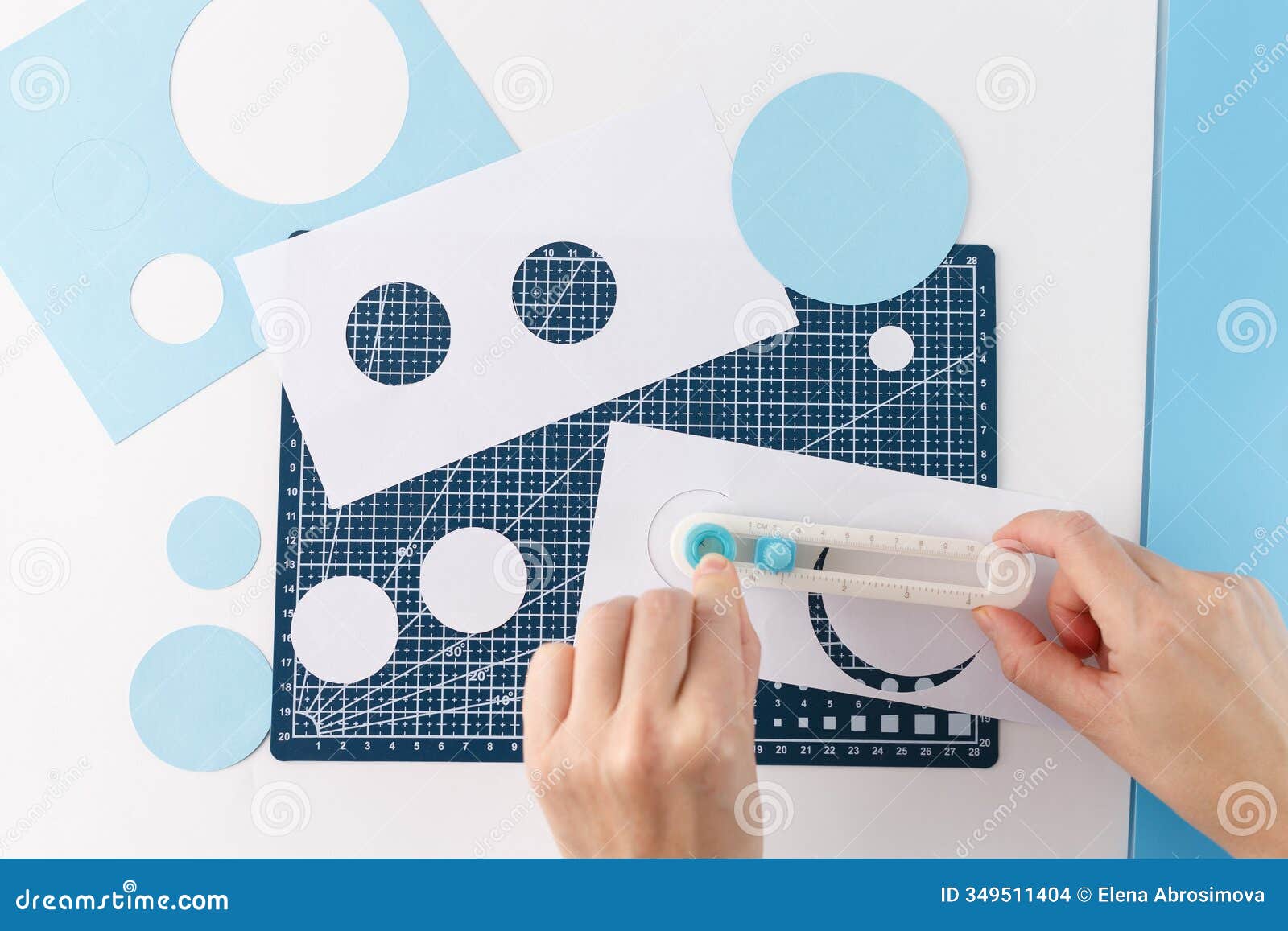 Top Down View Hands Using Manual Rotary Cutting Tool for Cut Out Paper ...