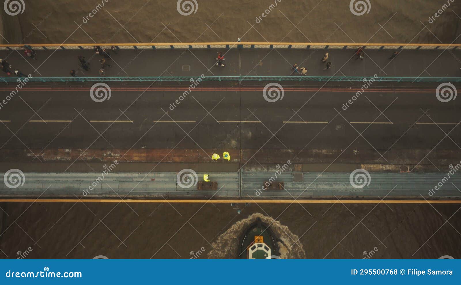 Top Down View of a Large Barge Passing Under Tower Bridge in London, UK ...