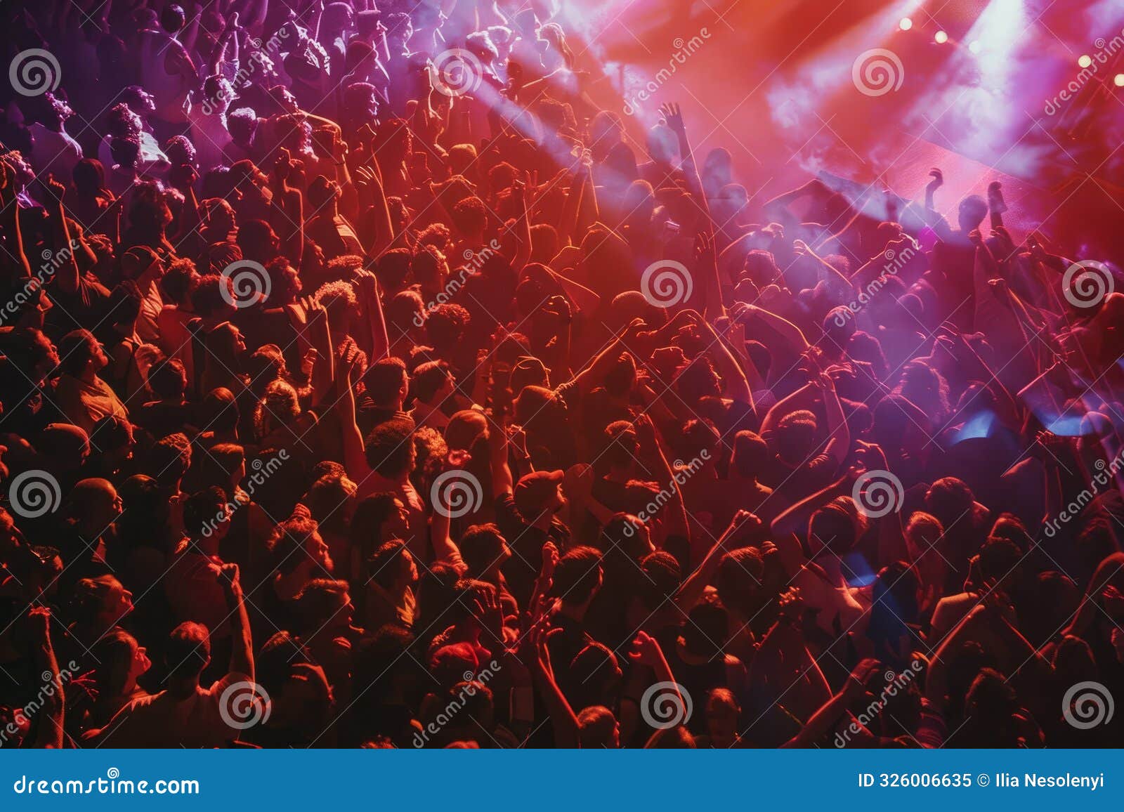 A Top-down View of a Massive Crowd Standing in Front of a Stage during ...