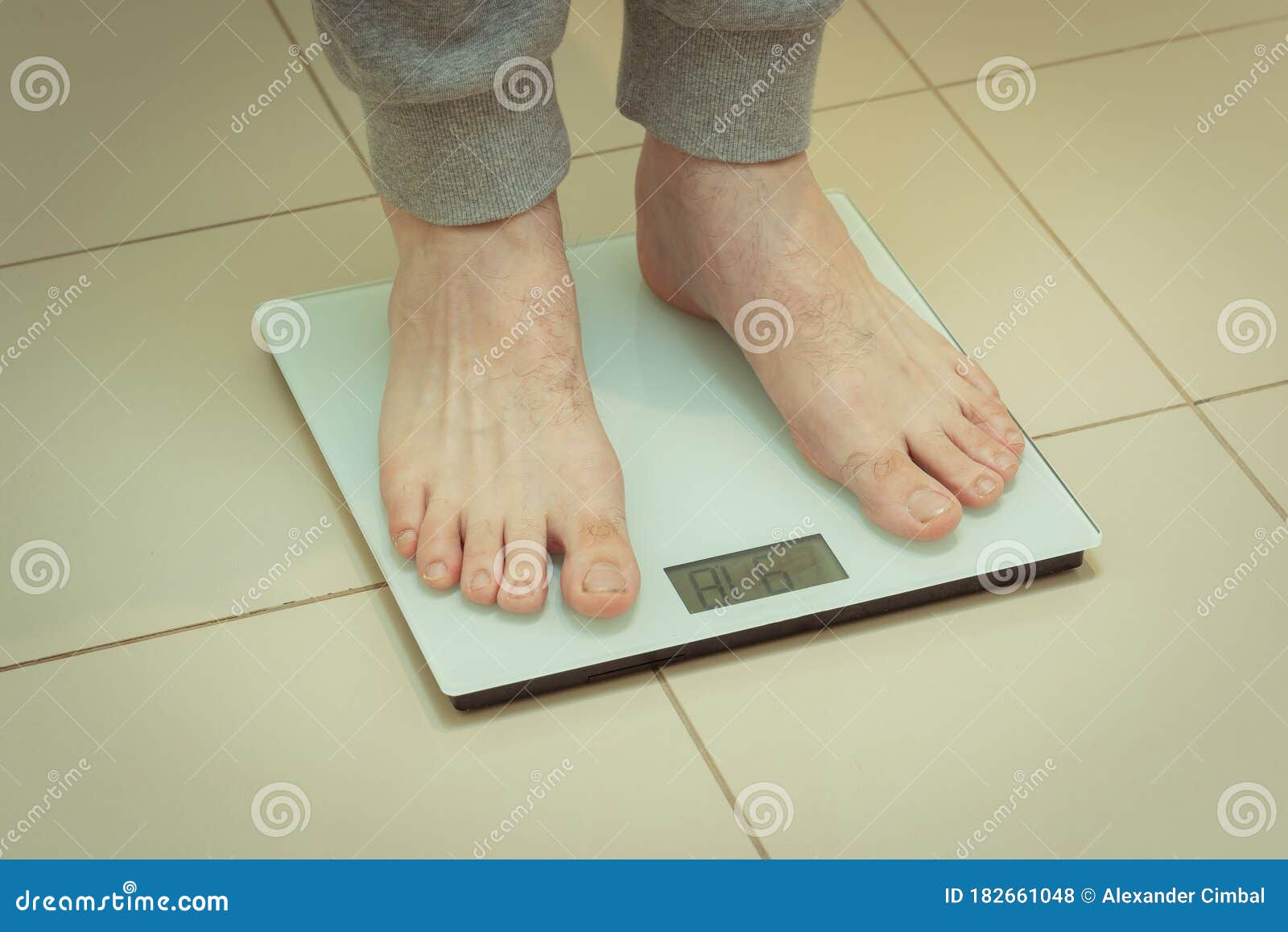 Top Down View of a Person Standing on Bathroom Scales Stock Photo ...