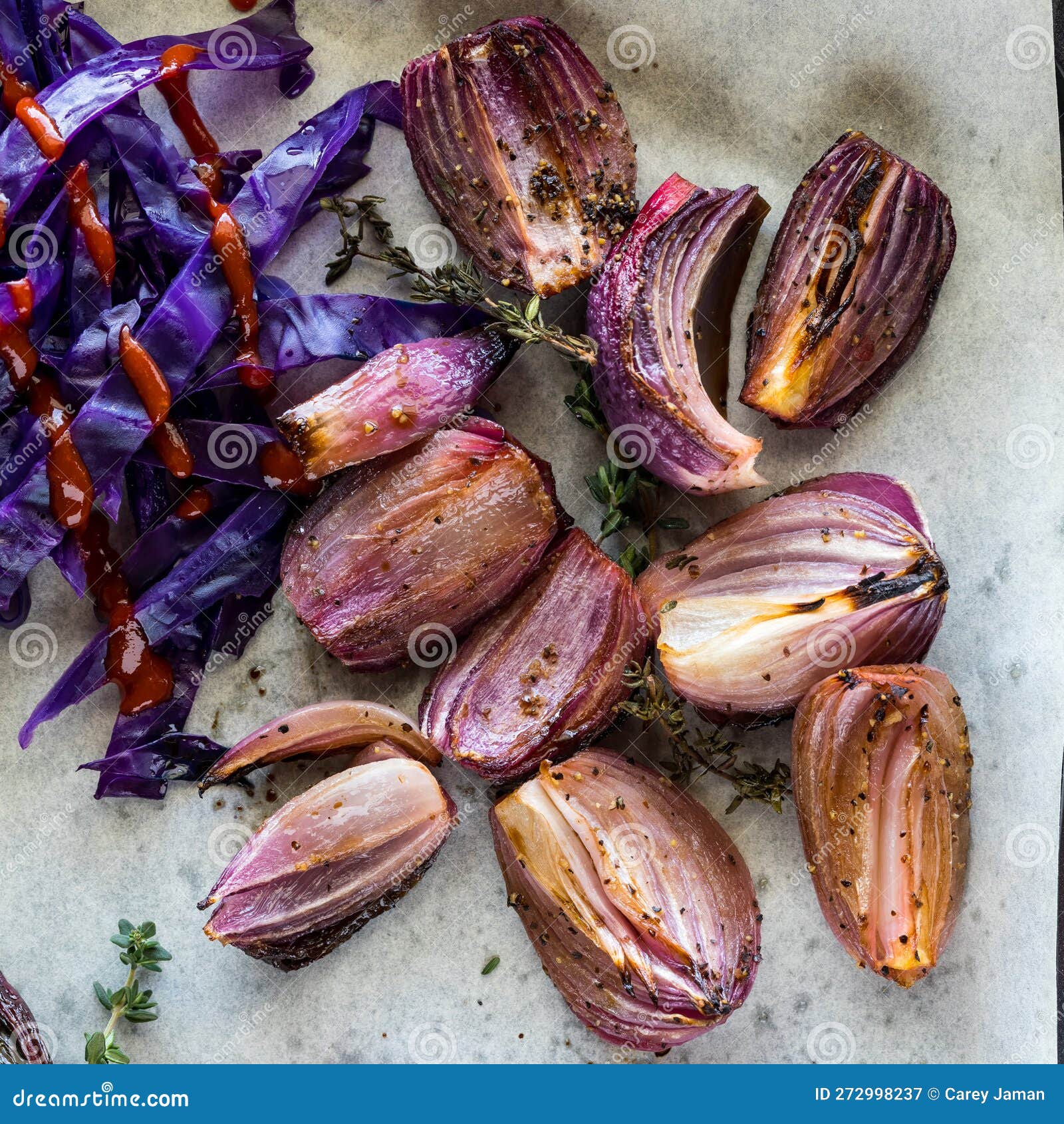 Top Down View of Roasted Red Onions Along Side Steamed Purple Cabbage ...