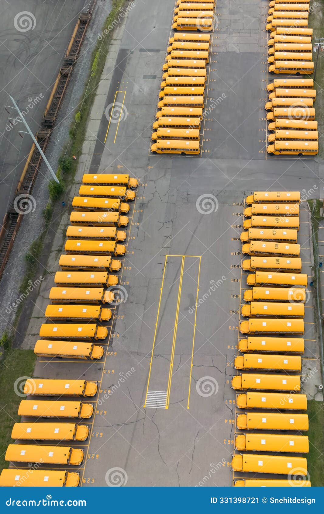 Top Down View of Rows of School Buses in Open Garage during School ...