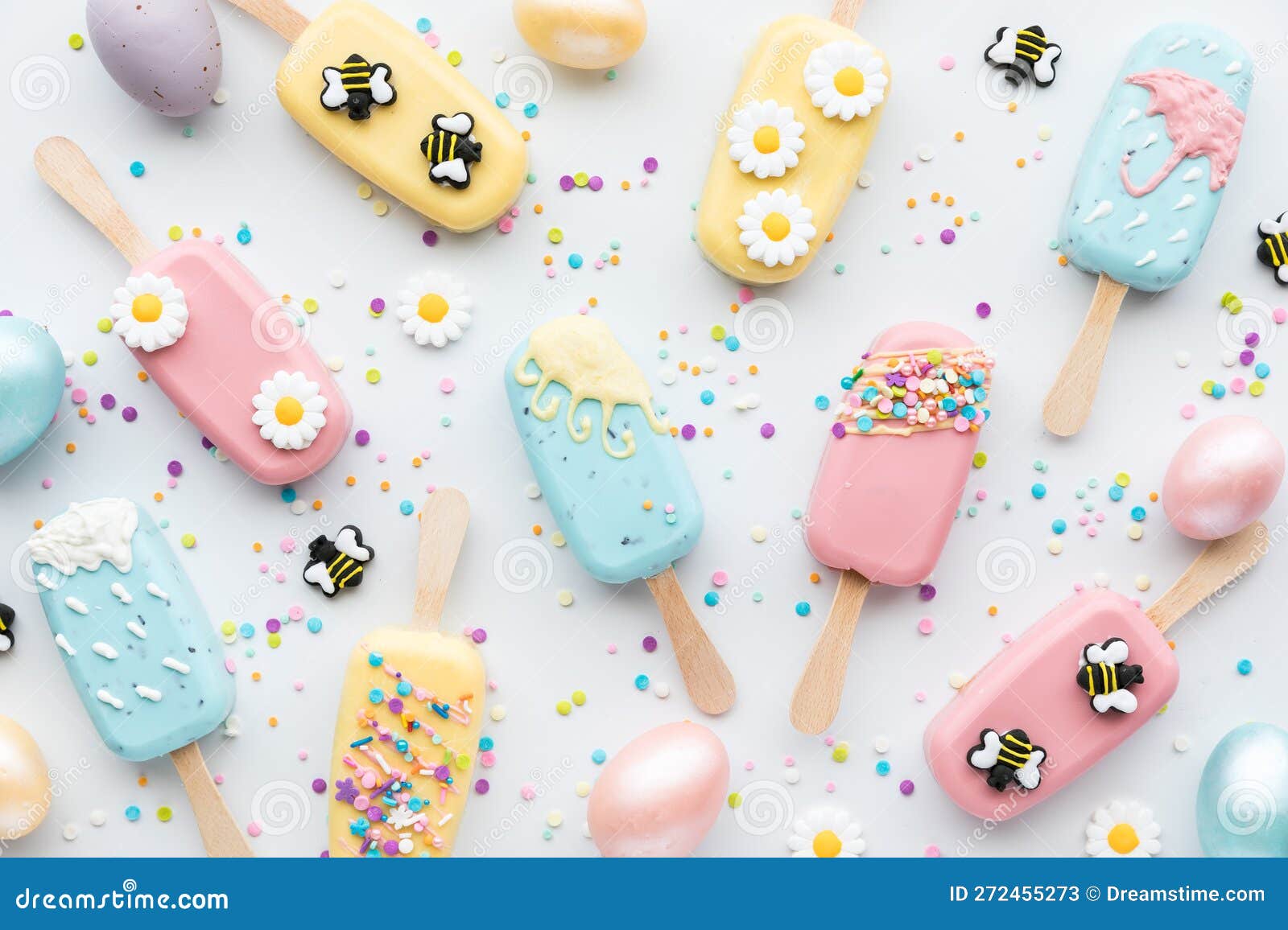 Top Down View of Several Homemade Cakesicles Decorated for Spring ...