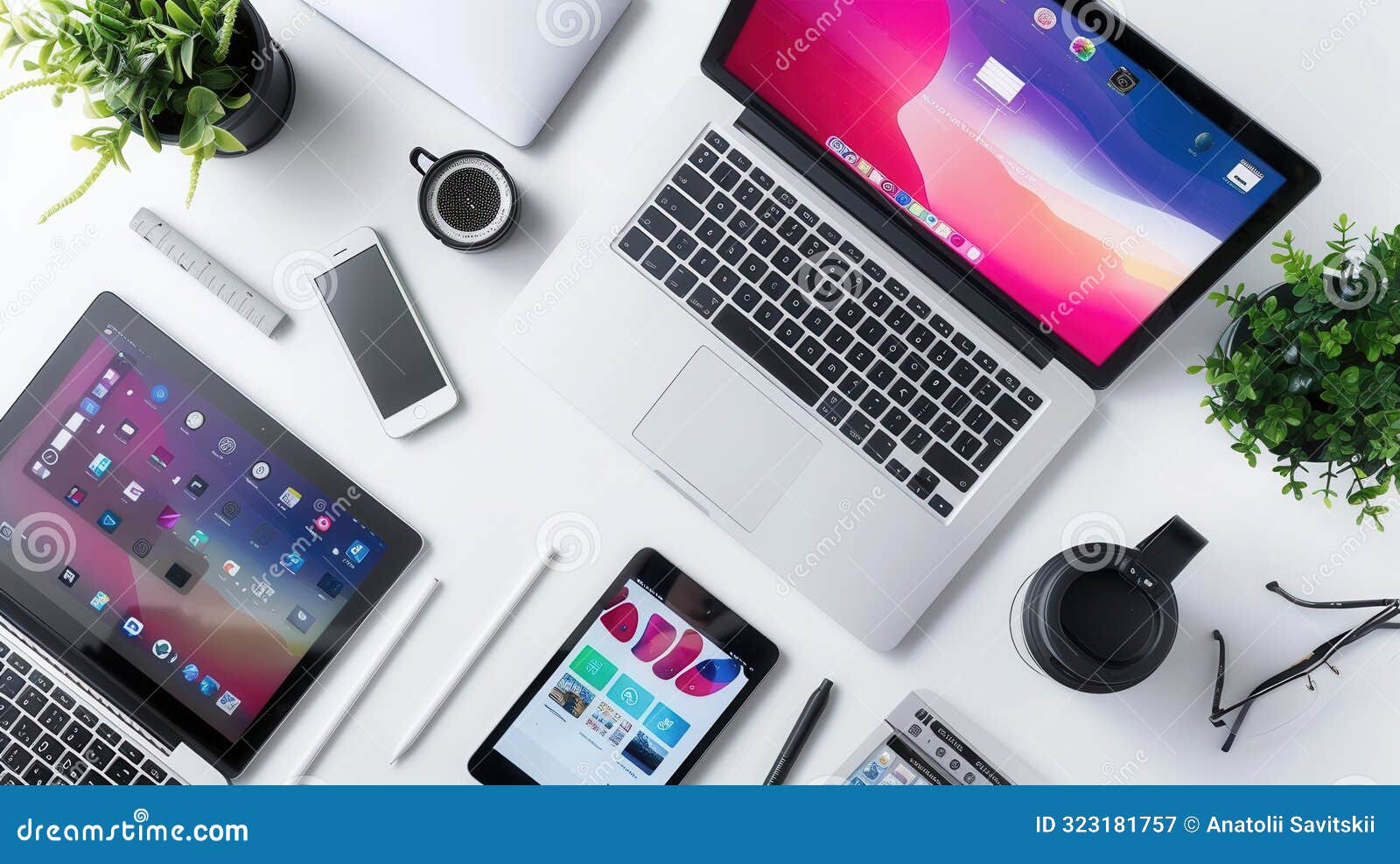 A Top-down View of a Sleek Desk with a Modern Laptop, Tablet, and ...