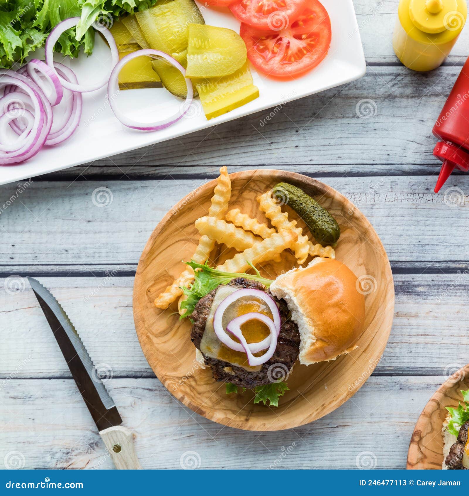 Top Down View of a Slider Cheeseburger with Fries and a Platter of ...