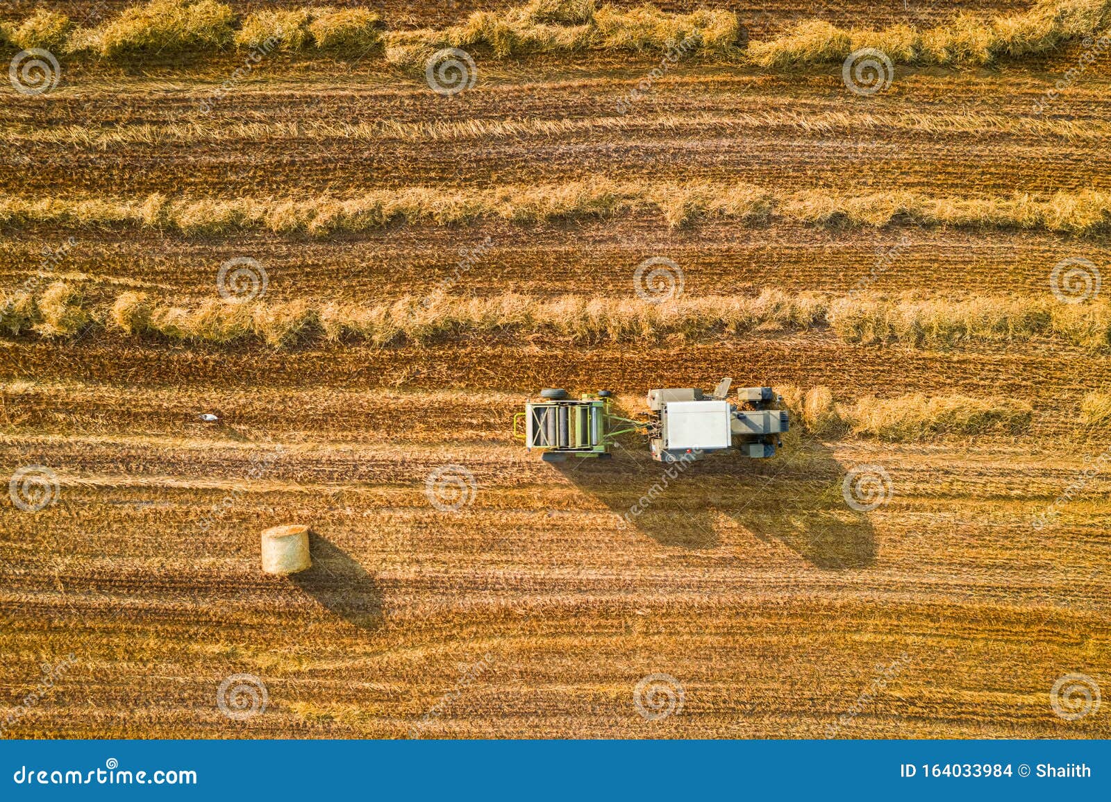 Top Down View of Tractor Collecting and Pressing Hay Stock Photo ...