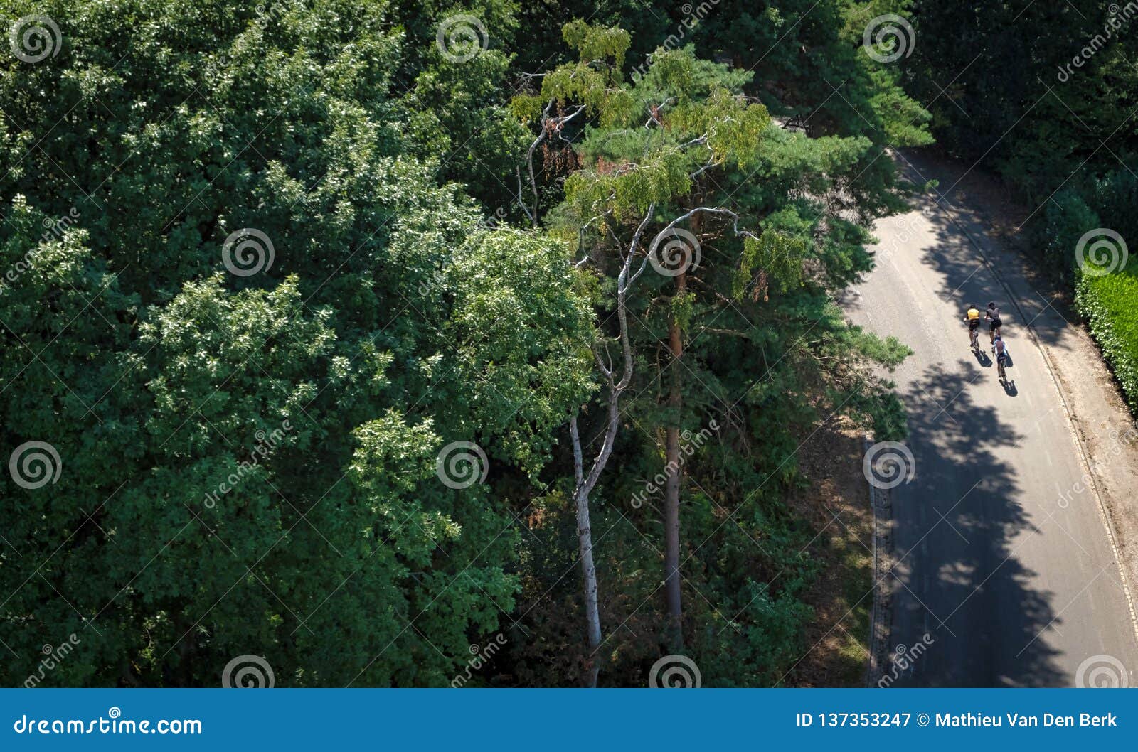 Top Down View of Two Bicyclists on a Road Stock Image - Image of rock ...