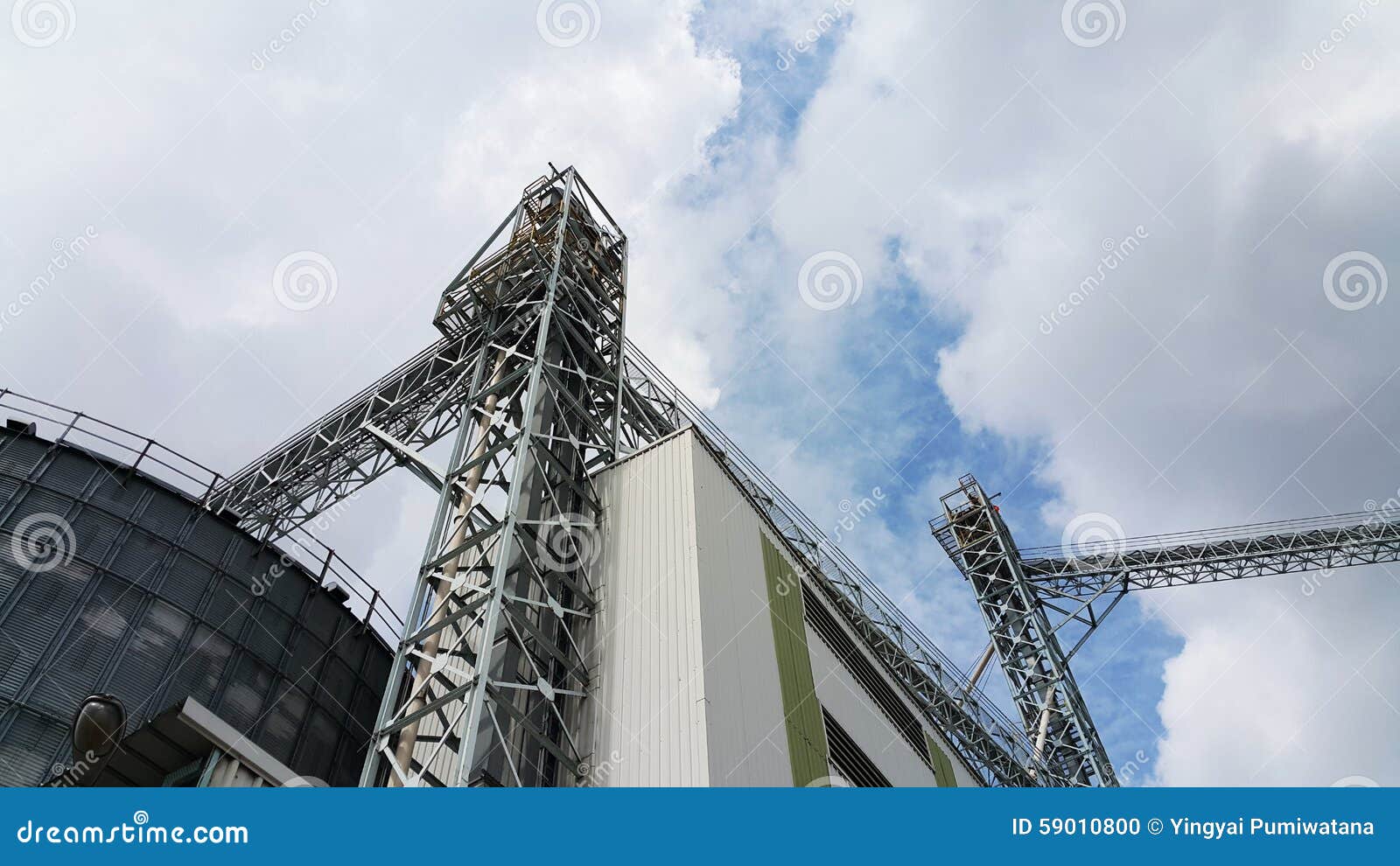 Top feed mill and blue sky stock photo. Image of storage - 59010800