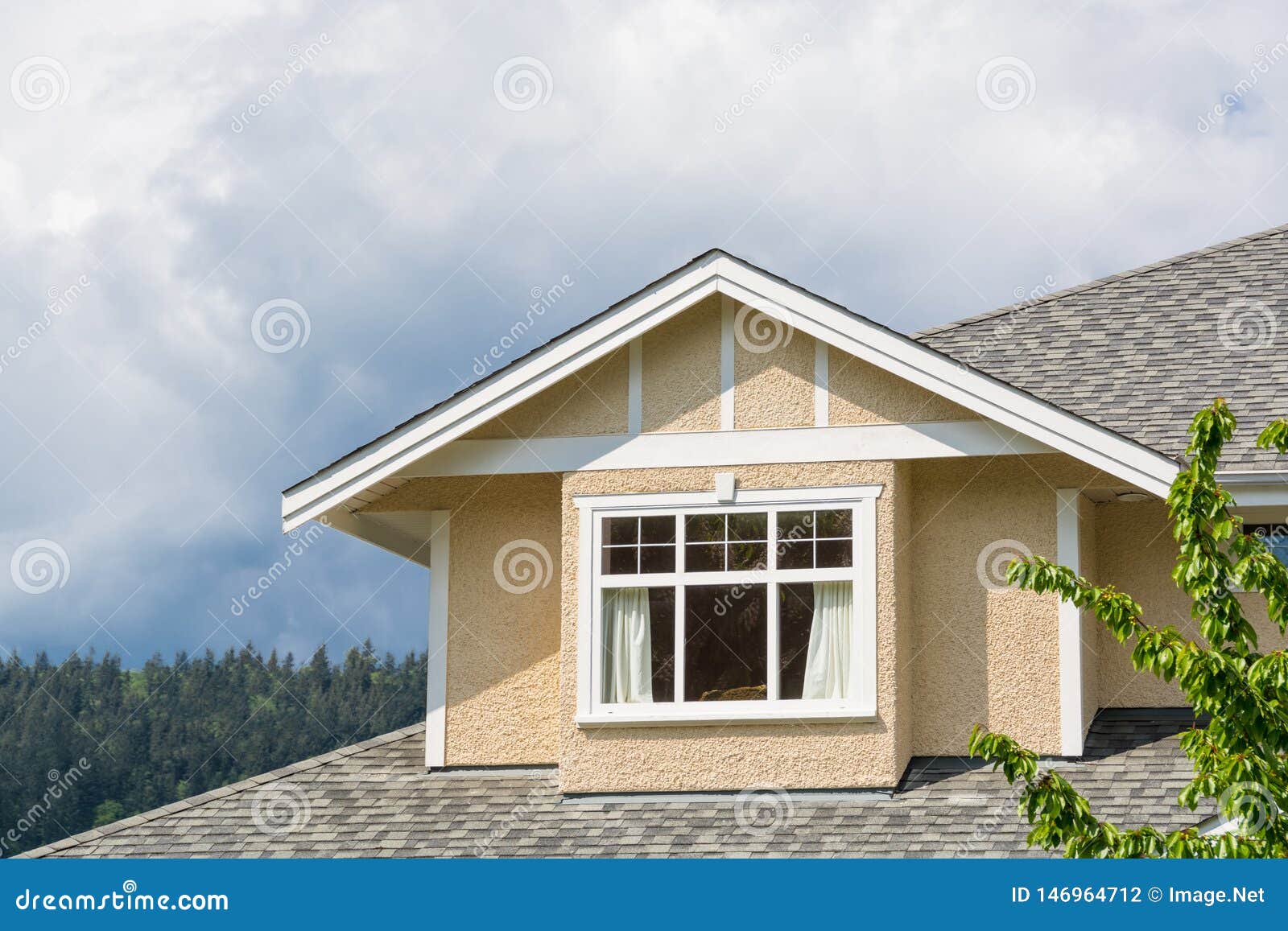 The Top of the House with Nice Windows on Cloudy Sky Background. Stock ...