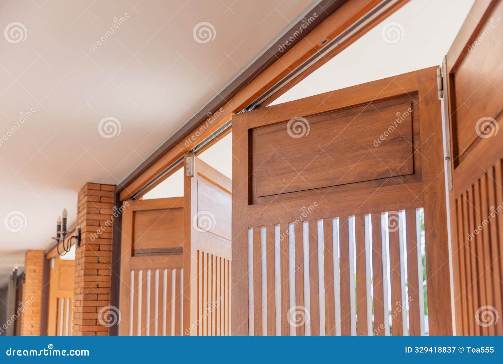 Top Hung Bifold System For Large Door Panels Royalty-Free Stock Photo | CartoonDealer.com #329418837
