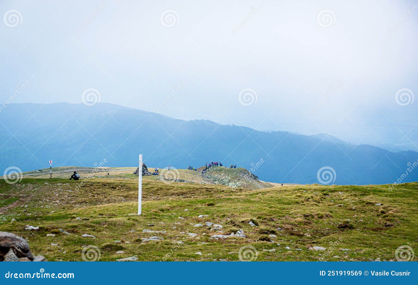 On the Top of the Mountain a Crowd of People are Climbing Stock Image ...