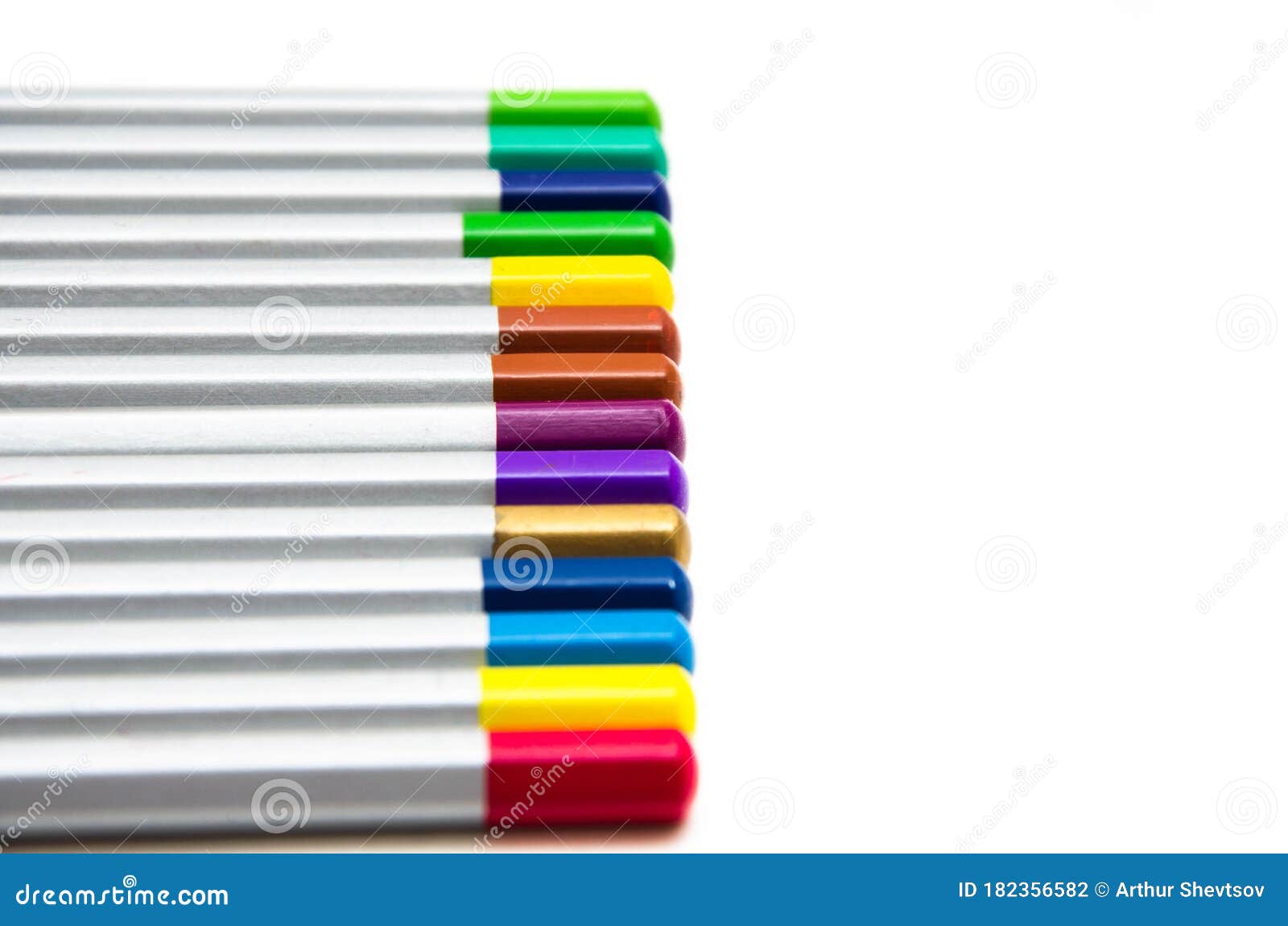 Top of the Pencil. Multi-colored Pencils in a Row on the Side and at an ...