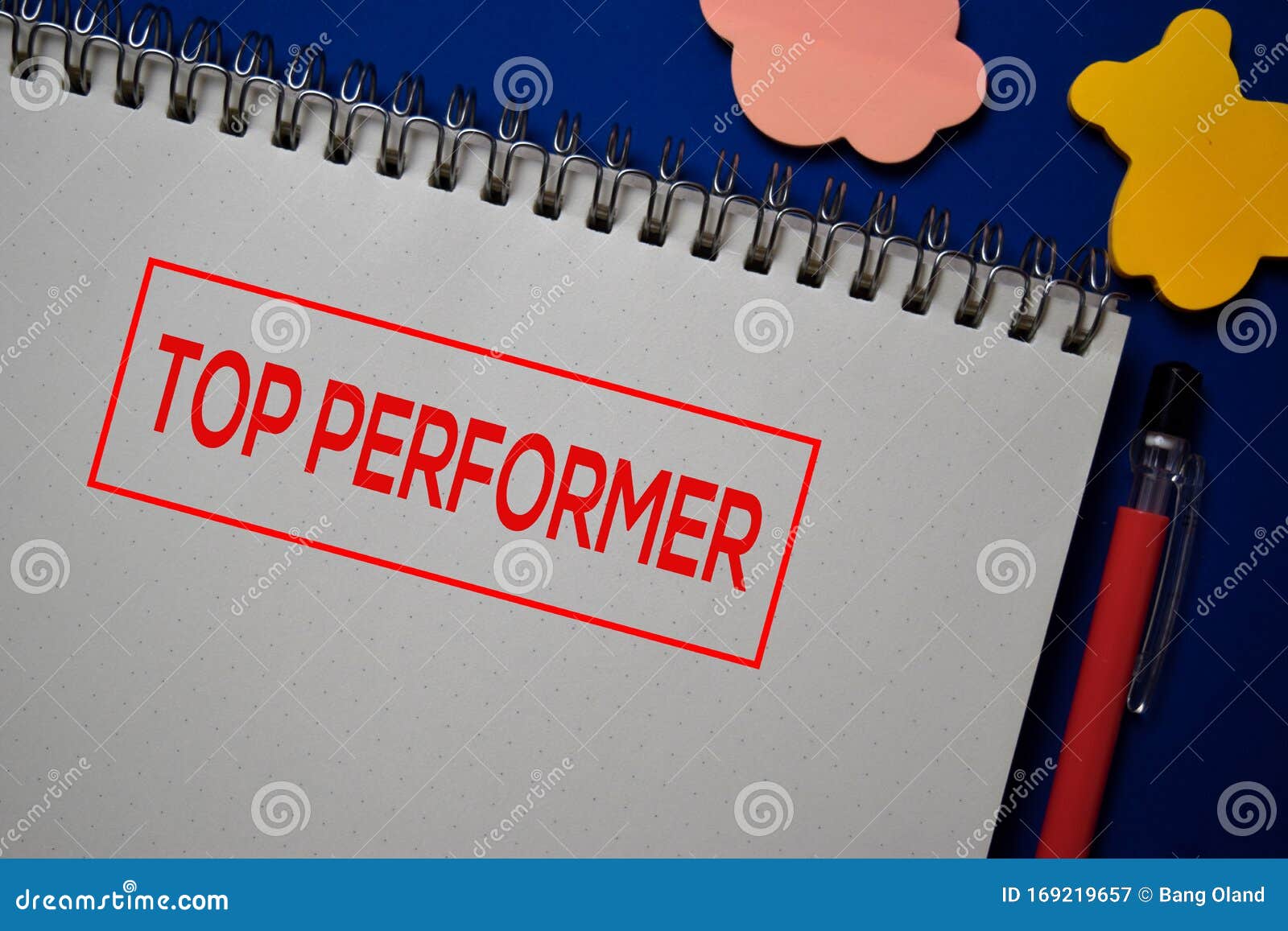 Top Performer Write on a Book Isolated on Blue Background Stock Image ...