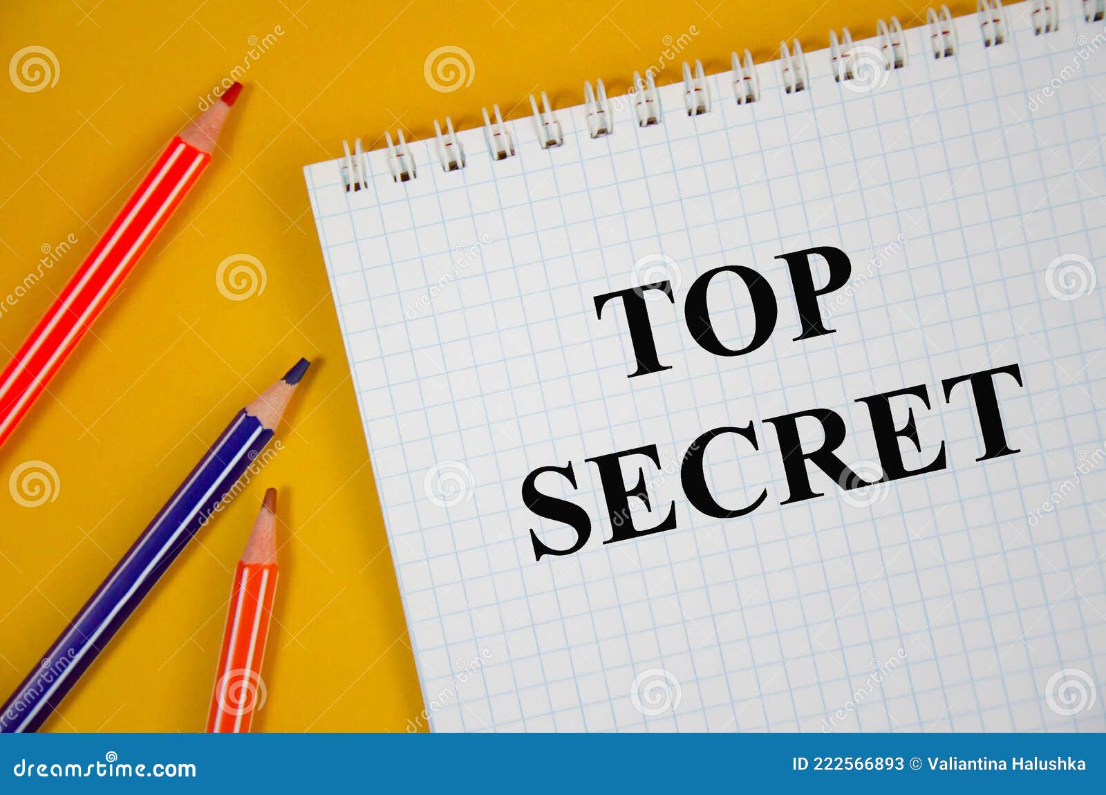 Top Secret The Word Is Written On A White Piece Of Paper With Pencils ...