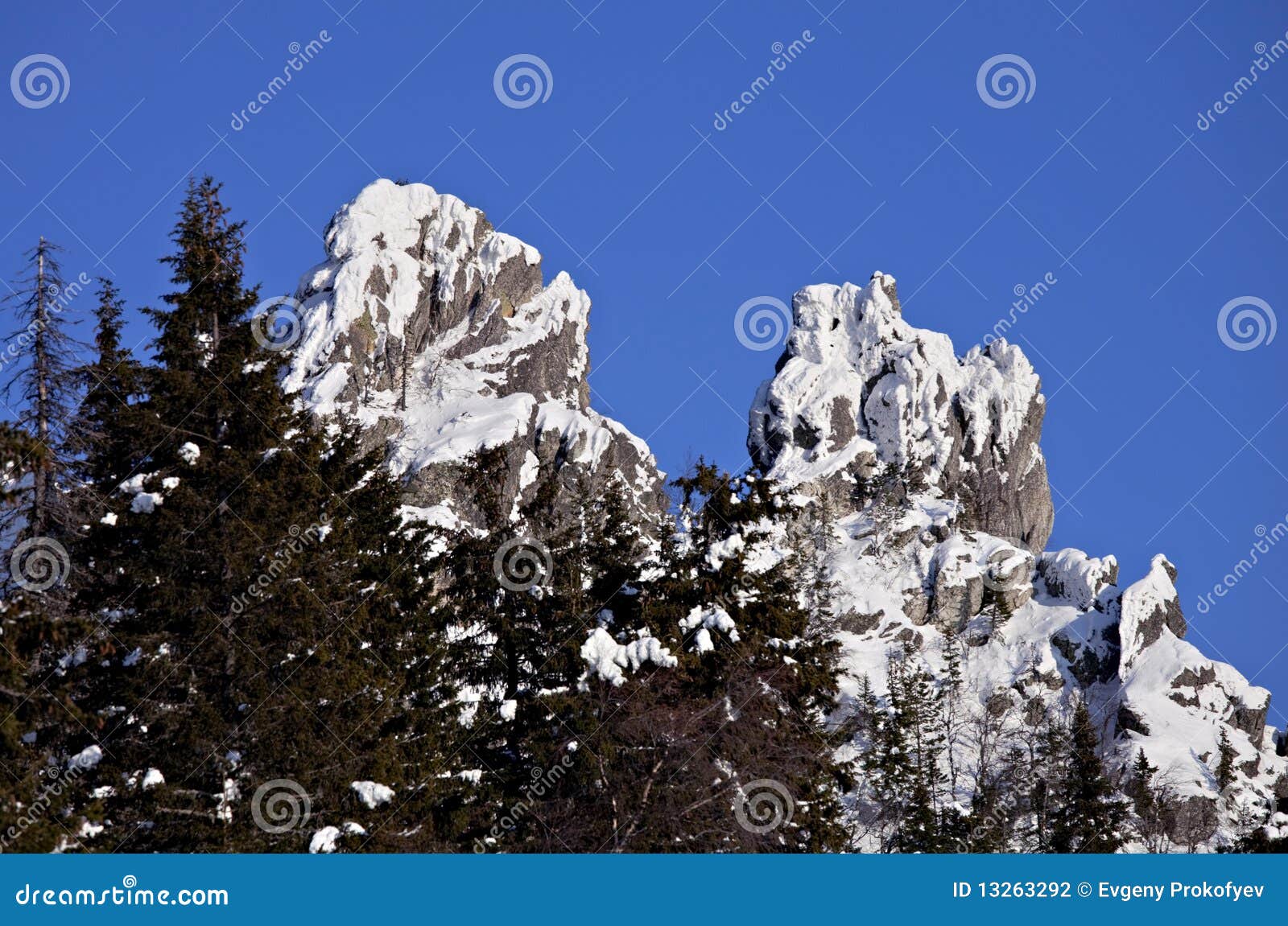 Top of snow-covered rocks stock photo. Image of mountain - 13263292