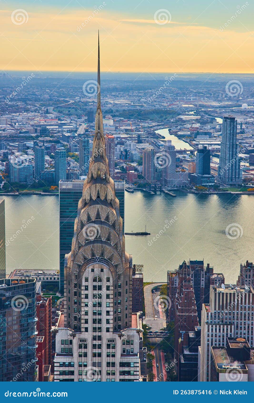 Top of Stunning New York City Skyscraper Vertical Overlooking River and ...