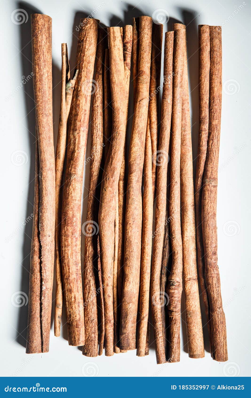 Top Vertical View on Heap of Dry Cinnamon Sticks Served on White Table ...