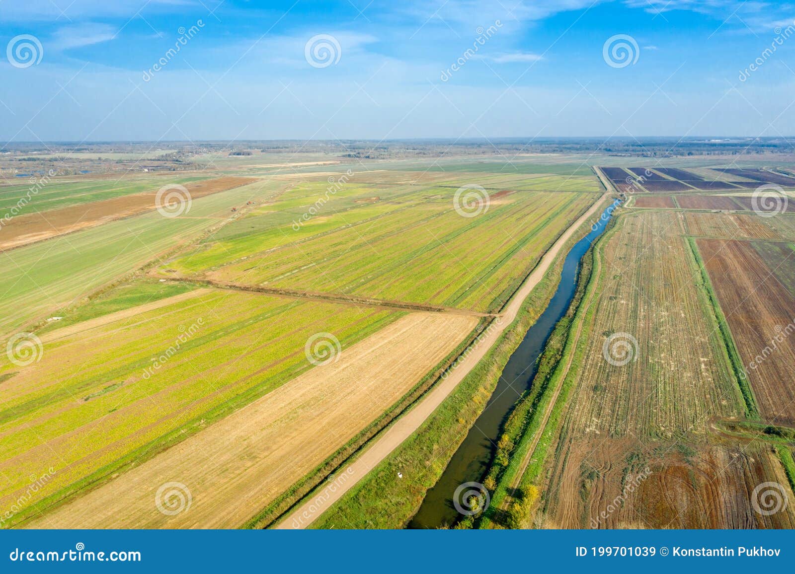 Road and Irrigation Canal Along the Field Stock Image - Image of ...