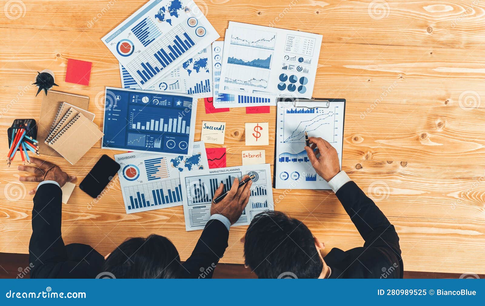 Top View Analyst Team Working on Dashboard Paper on Table. Fervent ...