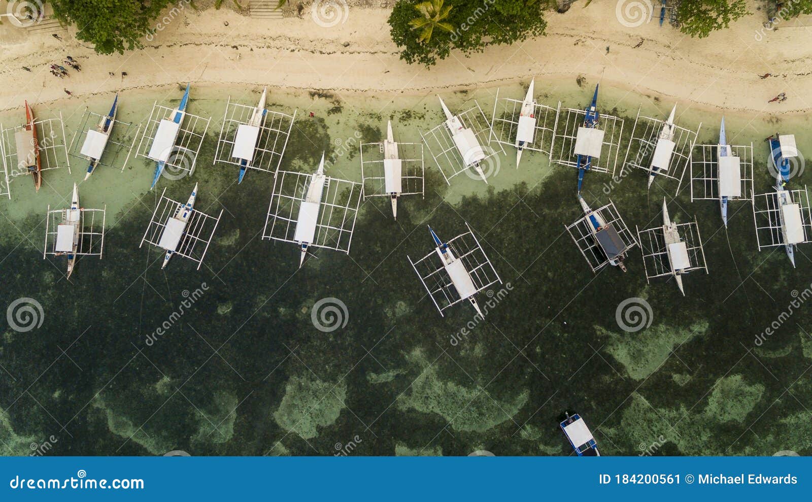 Top View of Anchored Boats on a Beach in Panglao, Late Afternoon Aerial ... Top View of Anchored Boats on a Beach in Panglao, Late Afternoon Aerial ...