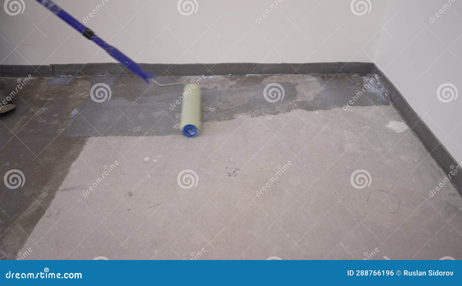 Top View of Applied Gray Epoxy. Priming the Floor with a Roller Stock ...