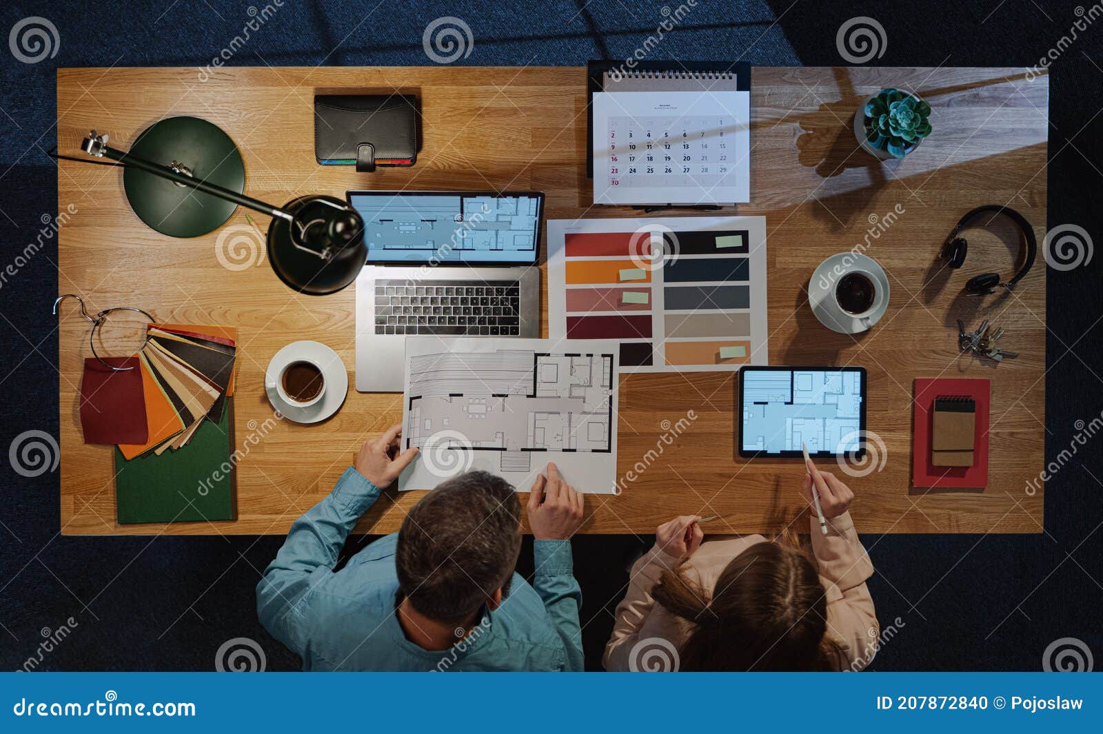Top View of Architects Working on Computer at Desk with Paperwork in ...