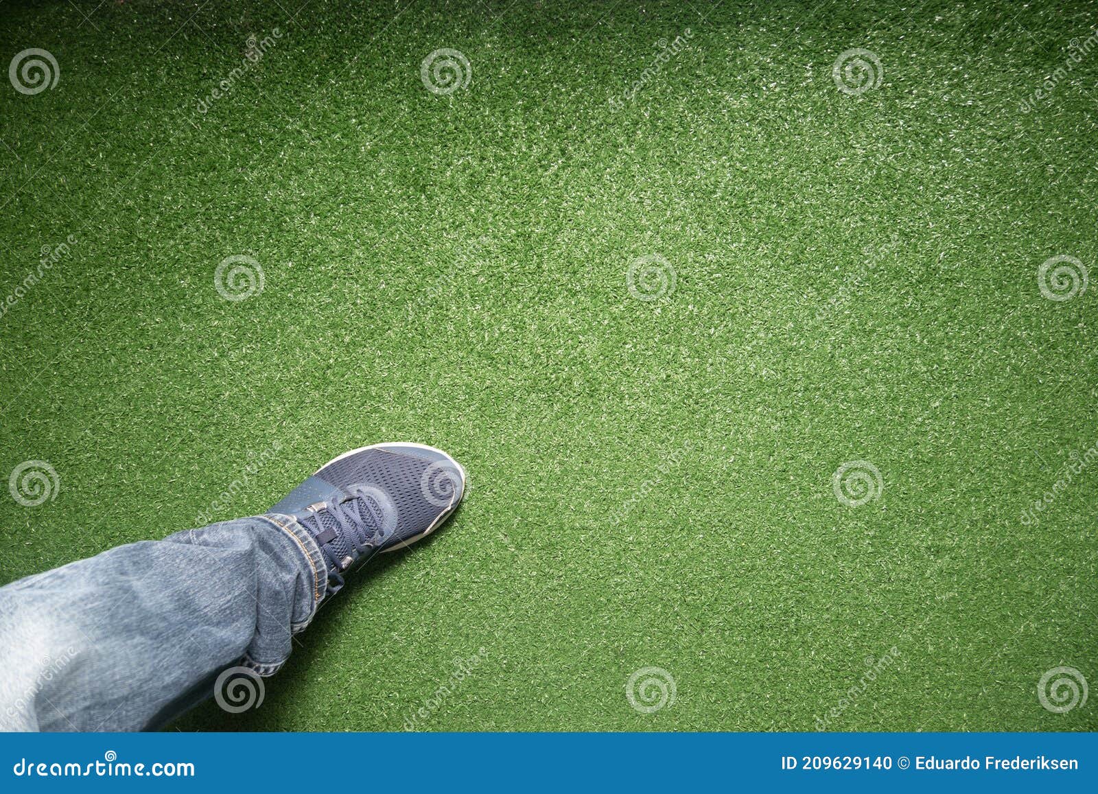 Top View of Artificial Green Grass Texture with Foot Entering from ...