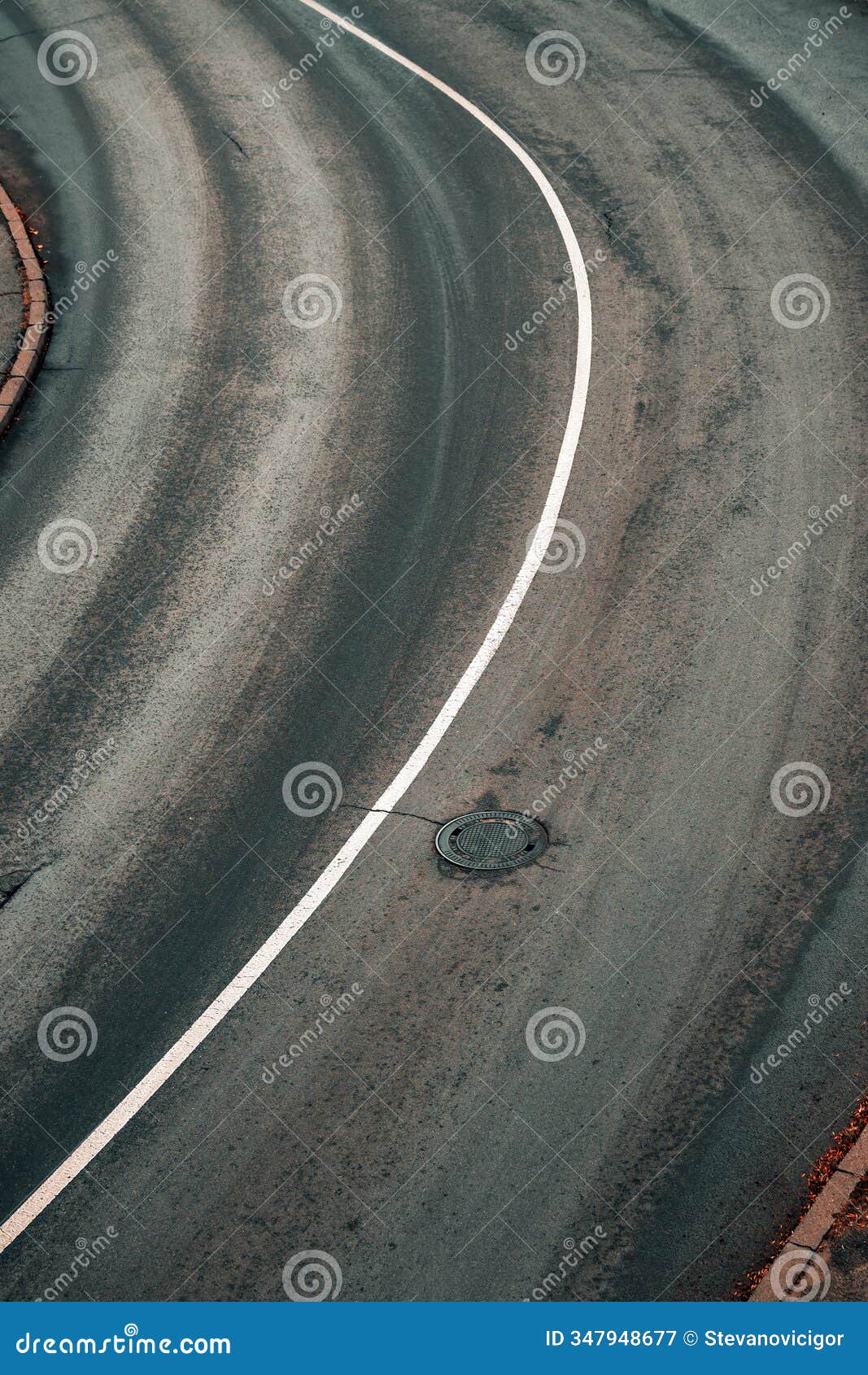 Top View Of A Manhole Cover On Drainage Or Sewerage Under Paved Road ...