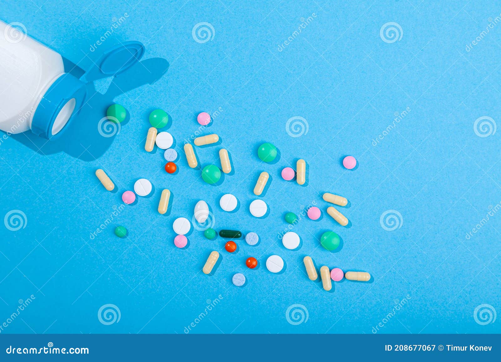 Top View of Assorted Scattered from Pill Bottle Colorful Tablets and ...