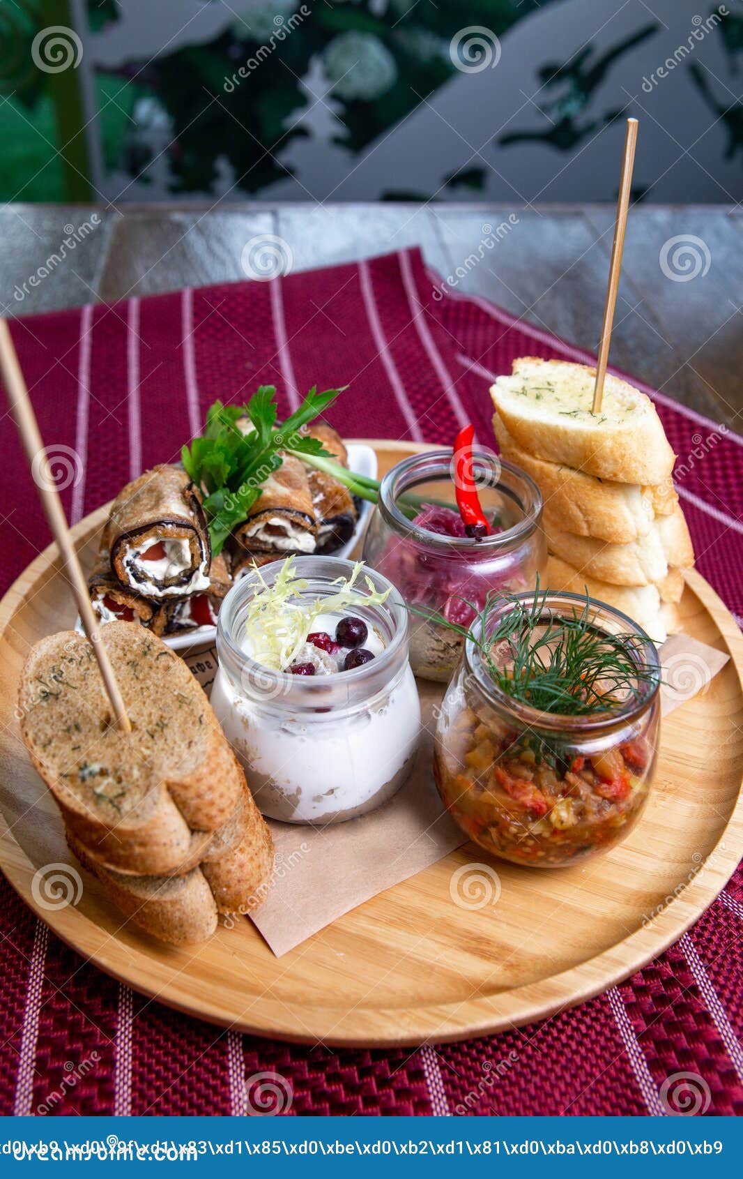 Top View of Assorted Snacks in Jars on a Wooden Stand on the Table ...