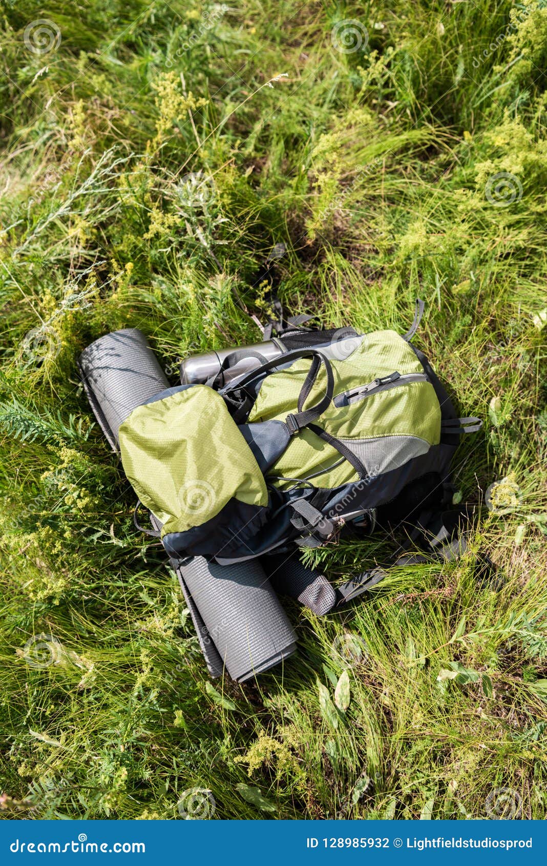 Top View of Backpack with Tourist Mat and Thermos Stock Photo - Image ...