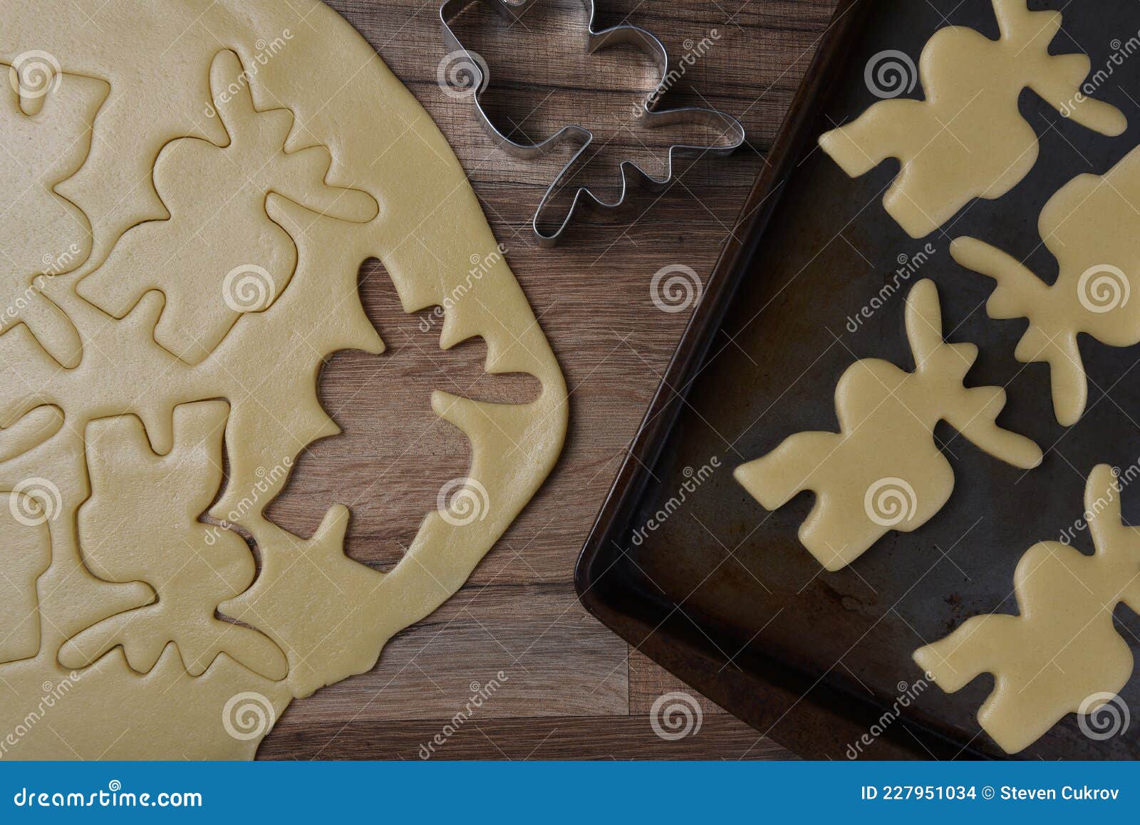 Top View of a Baking Sheet with a Moose Shaped Sugar Cookies, Dough and ...