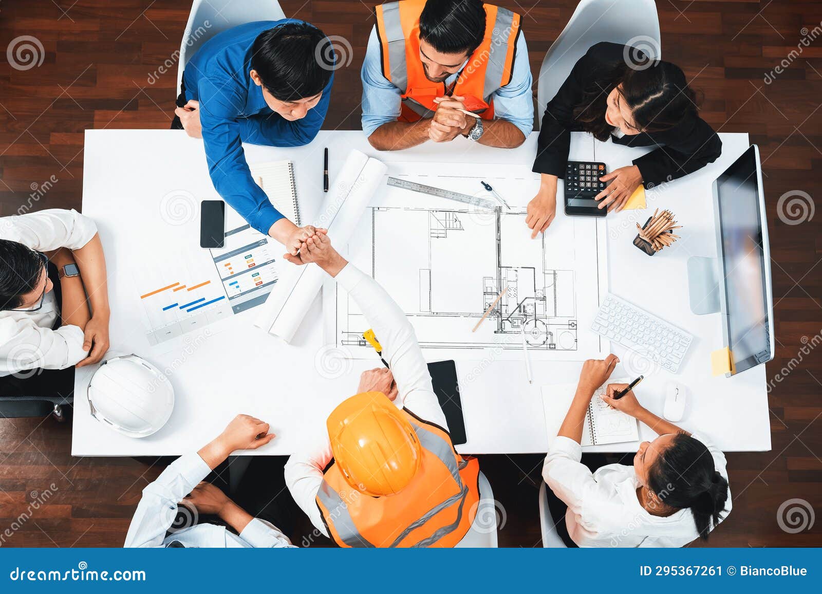 Diverse Group of Civil Engineer and Client Celebrate and High Five ...