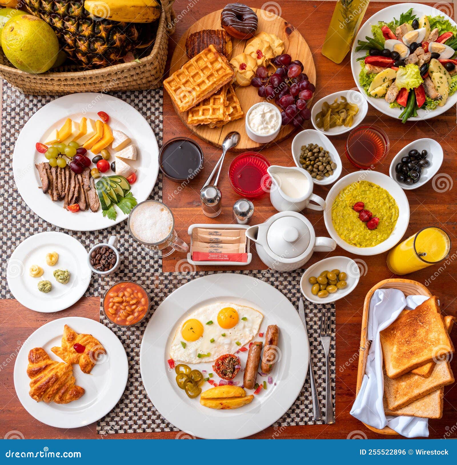Top View of a Beautiful Breakfast Spread with Fried Eggs, Pastries ...