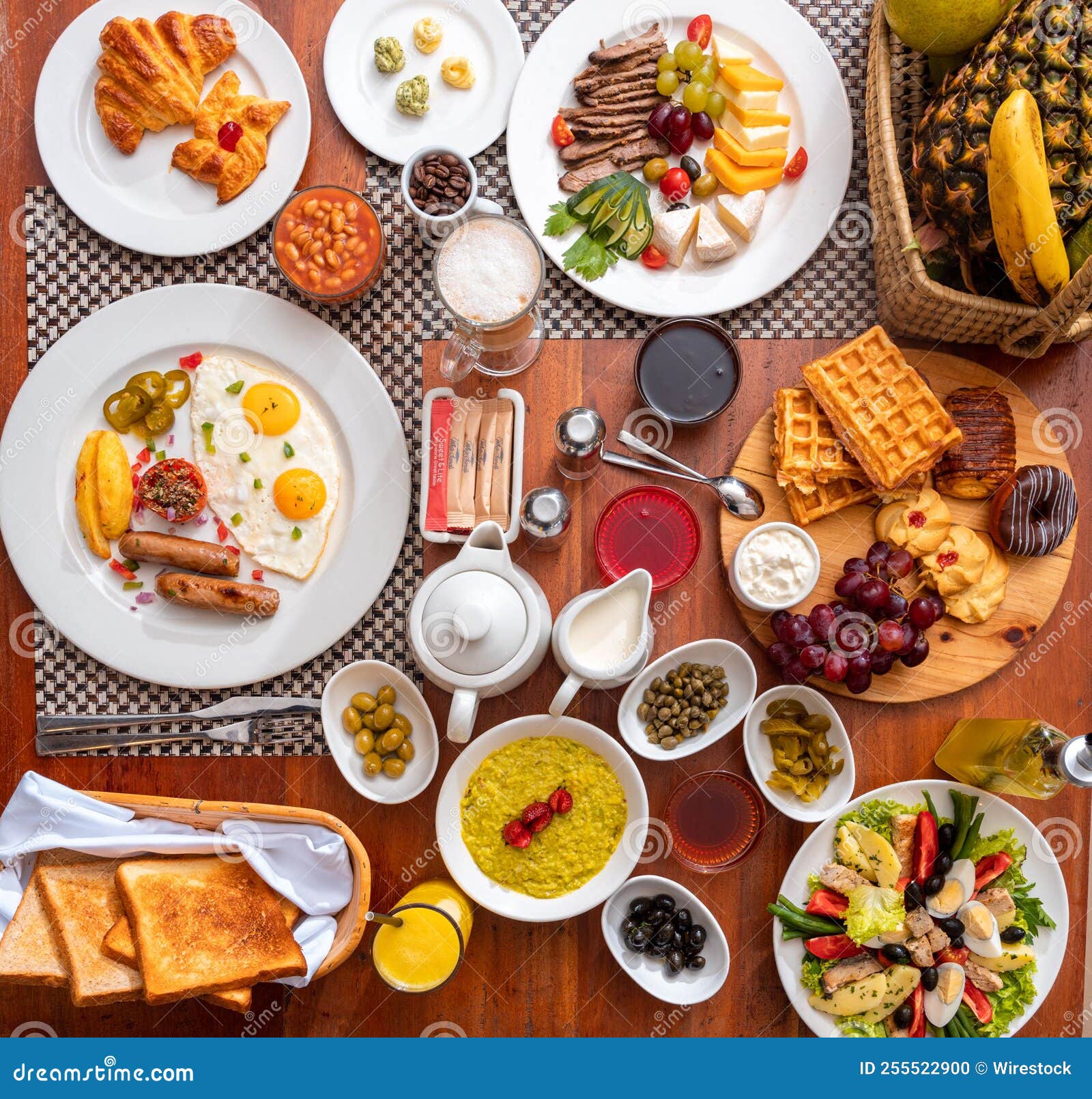 Top View of a Beautiful Breakfast Spread with Fried Eggs, Pastries ...