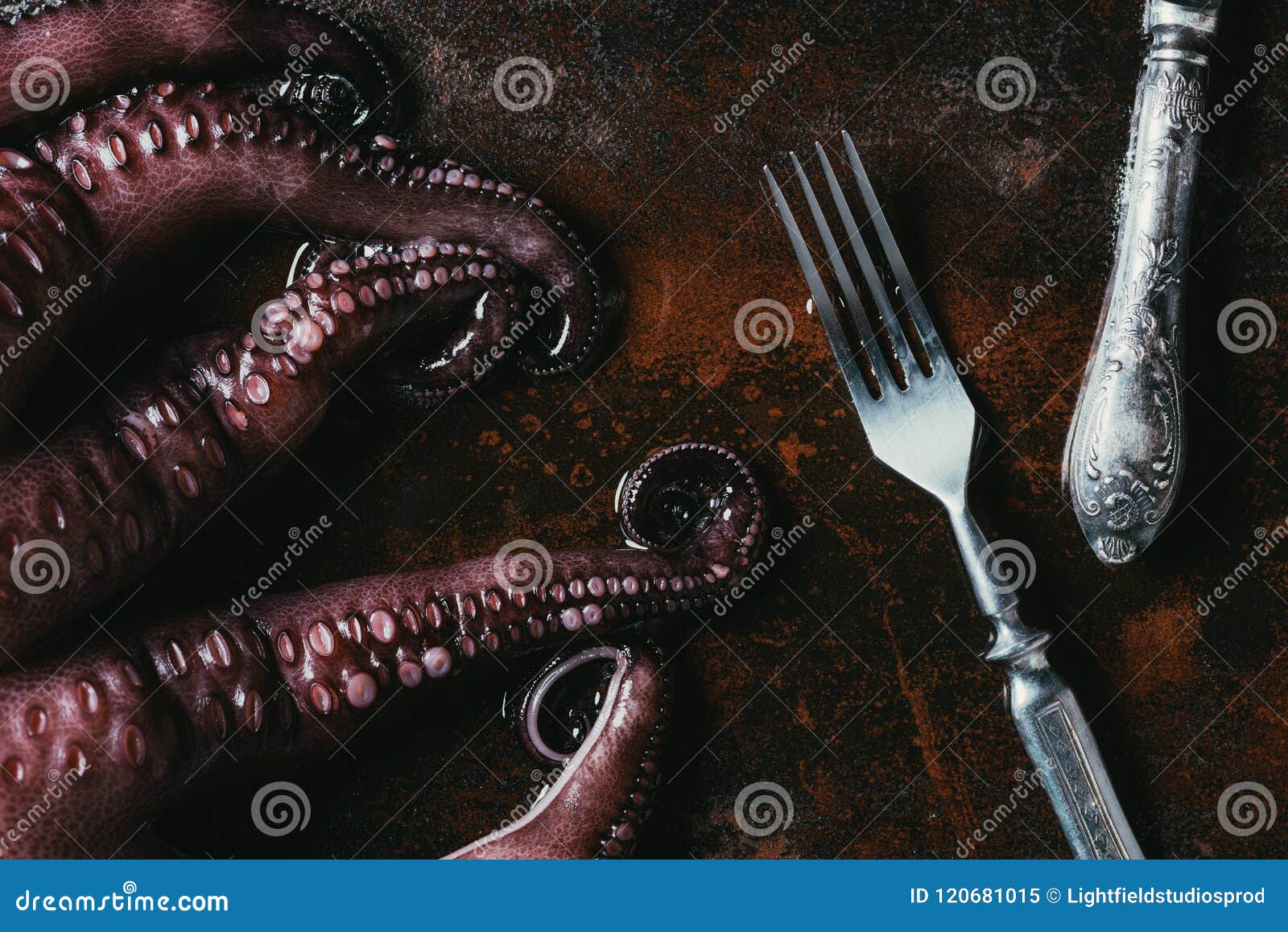 Top View of Big Octopus with Fork and Knife on Rusty Stock Image ...