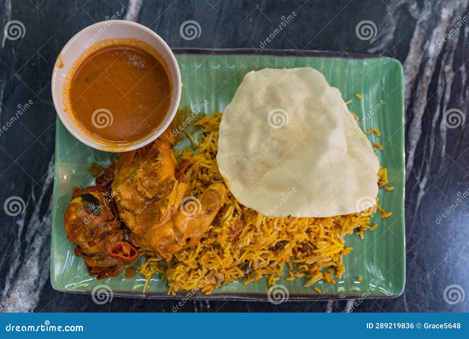Top View of the Biryani Rice with Curry Chicken and Papadam Stock Photo ...